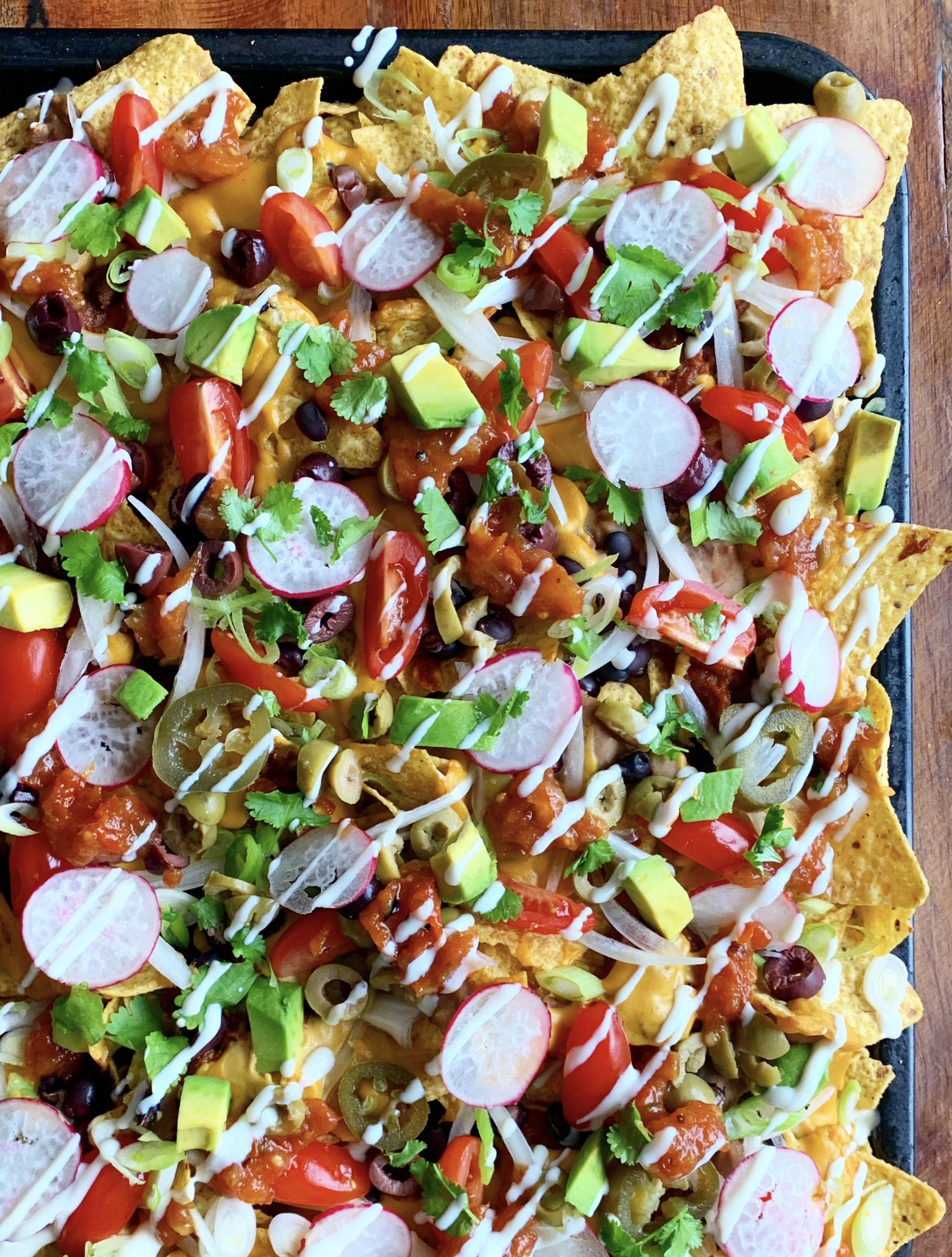 A huge tray of fully loaded vegan nachos... aka heaven | Scrolller