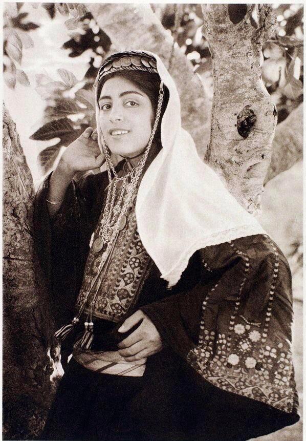 A Palestinian woman in the traditional dress 1927, Beit Lahem | Scrolller