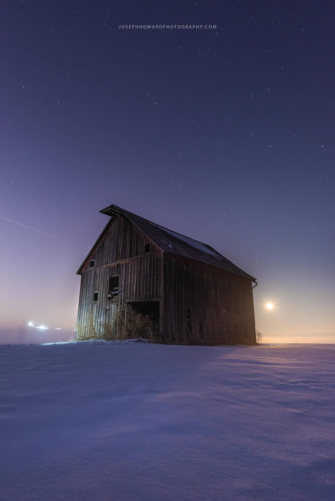 A rustic barn under moonlight | Scrolller