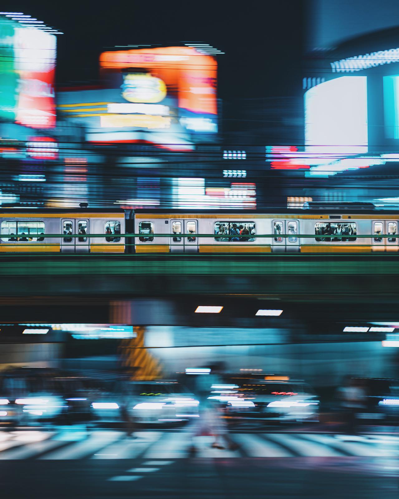 A train passing through Shinjuku, Tokyo. | Scrolller