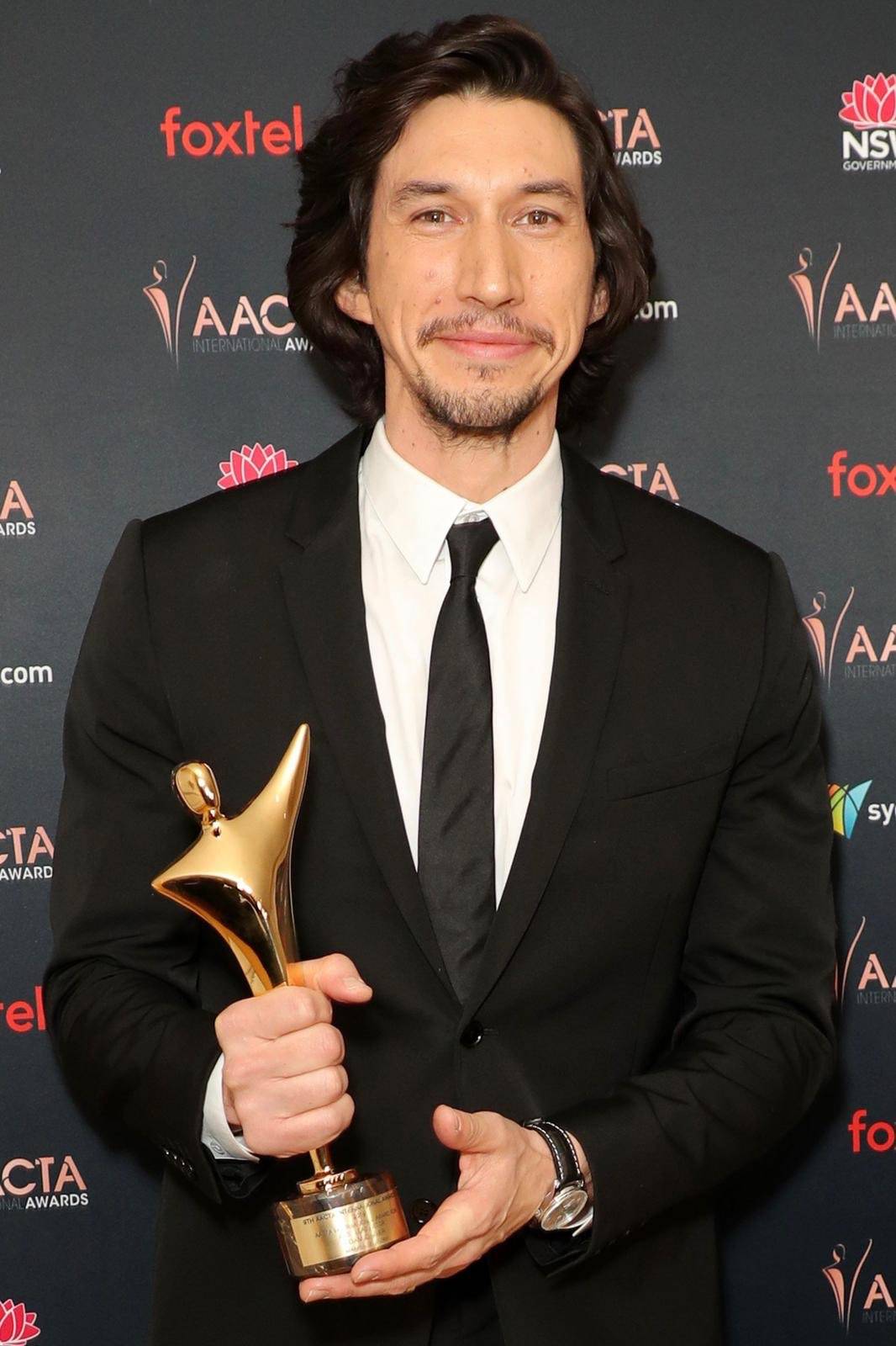 Adam Driver with his AACTA International Award for Best Male Lead Actor | Scrolller