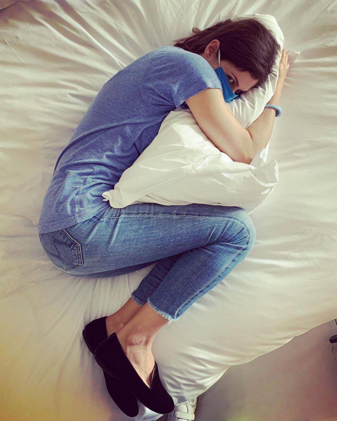 Alexandra Daddario in the fetal position | Scrolller