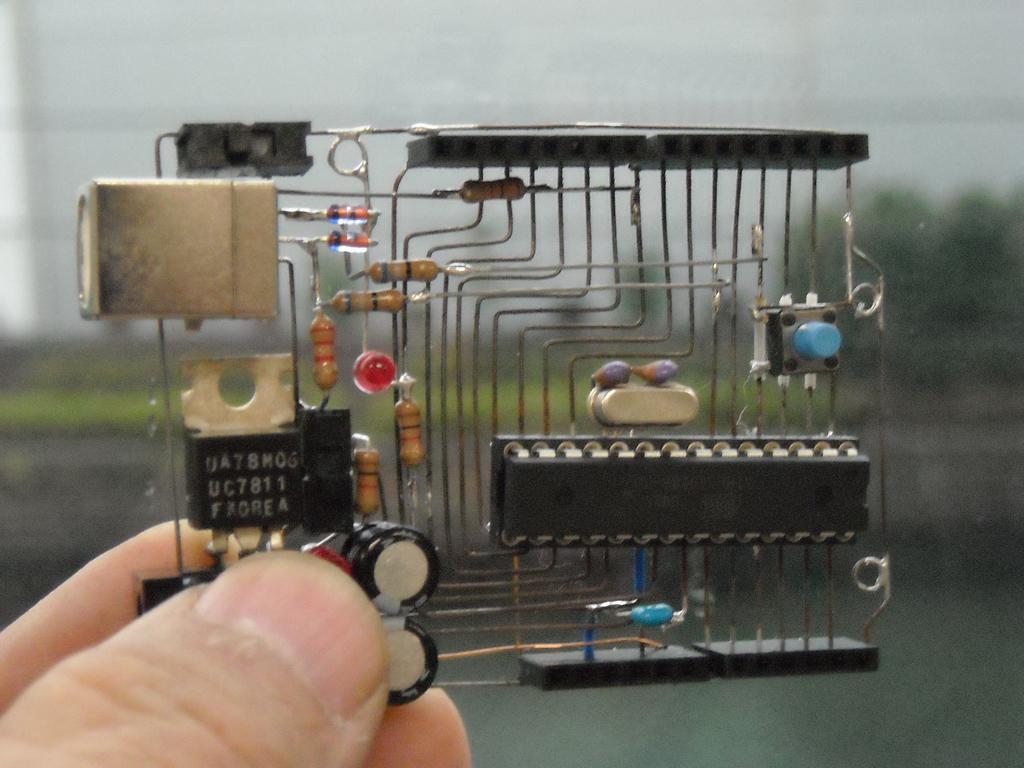 An Arduino Uno made without any substrate, just wires and components. Made by Kimo Kosaka ...