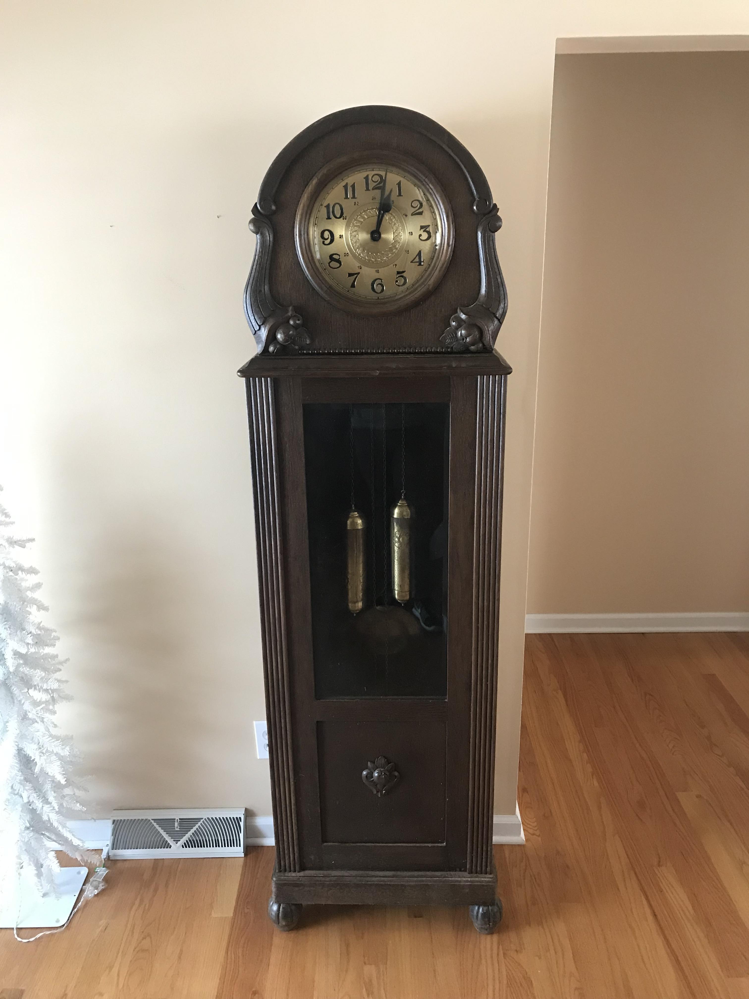 Any help identifying this grandfather clock given to me by my great grandfather? | Scrolller