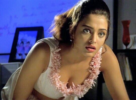 Ash teasing us with a glimpse of her cleavage | Scrolller