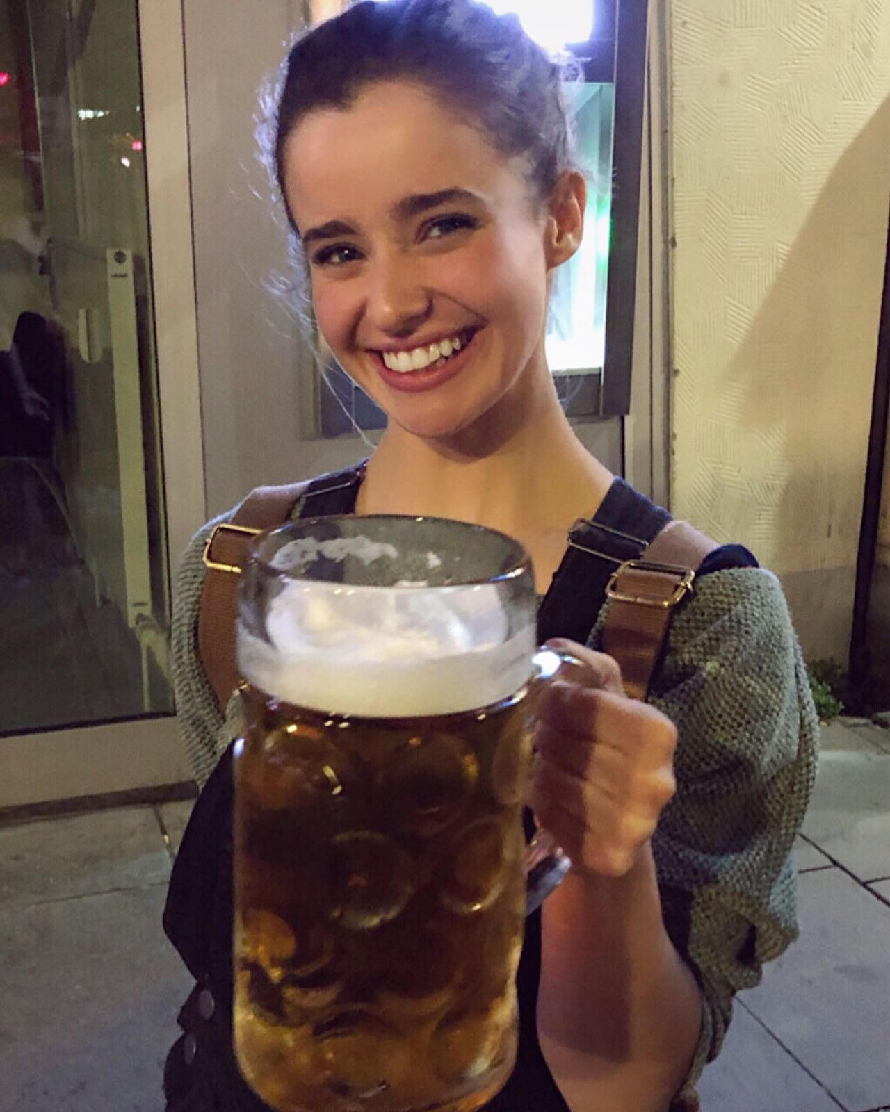 Beer twice the size of her head | Scrolller