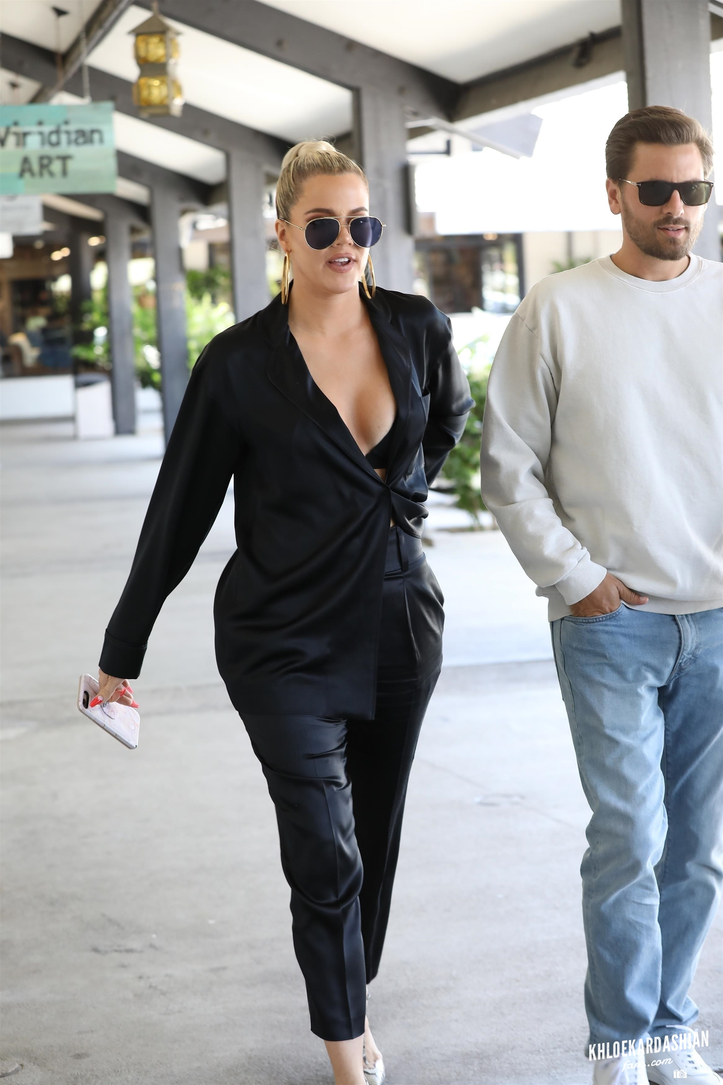 Black Bra visible in black outfit | Scrolller