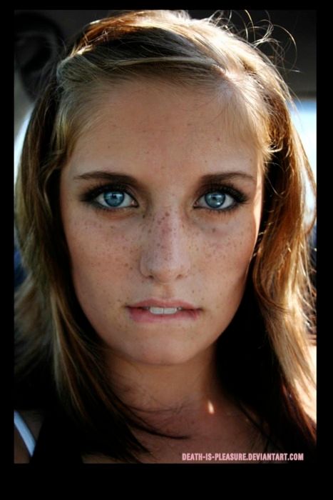 Blue eyes and freckles. | Scrolller