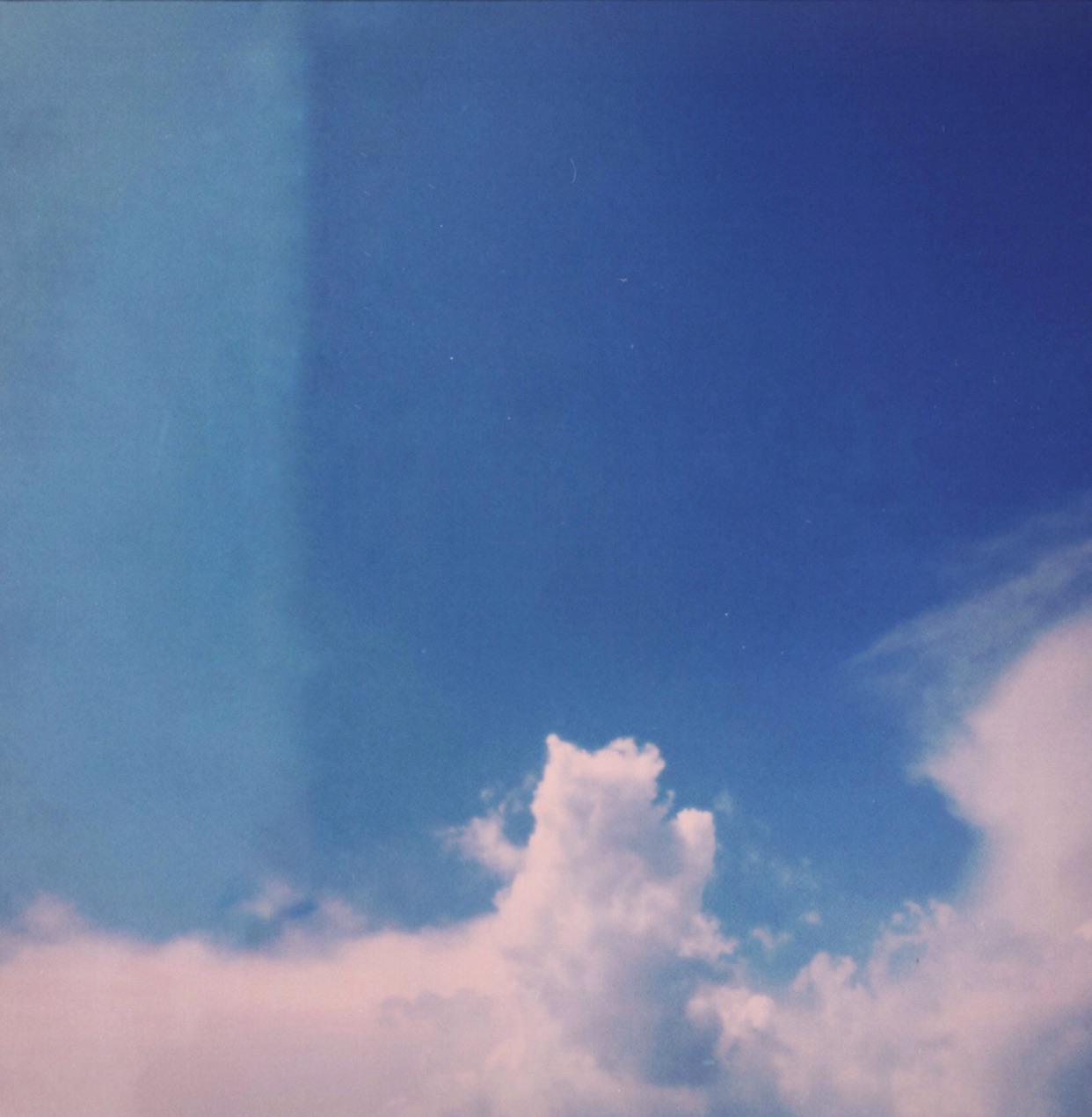 Blue skies | sx-70 | 600 film + nd filter | Scrolller