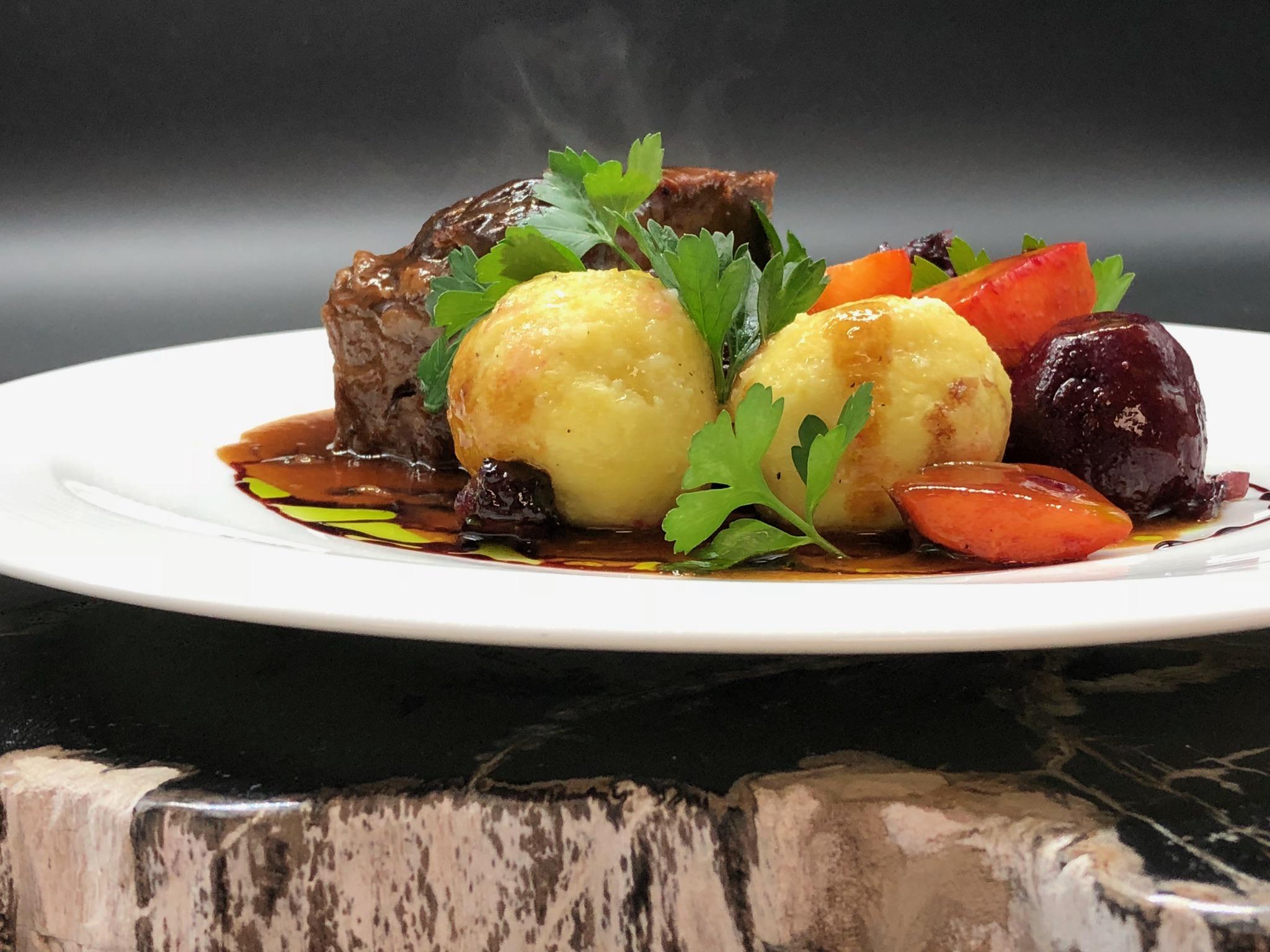 Braised short rib of beef, dumplings and root vegetables | Scrolller