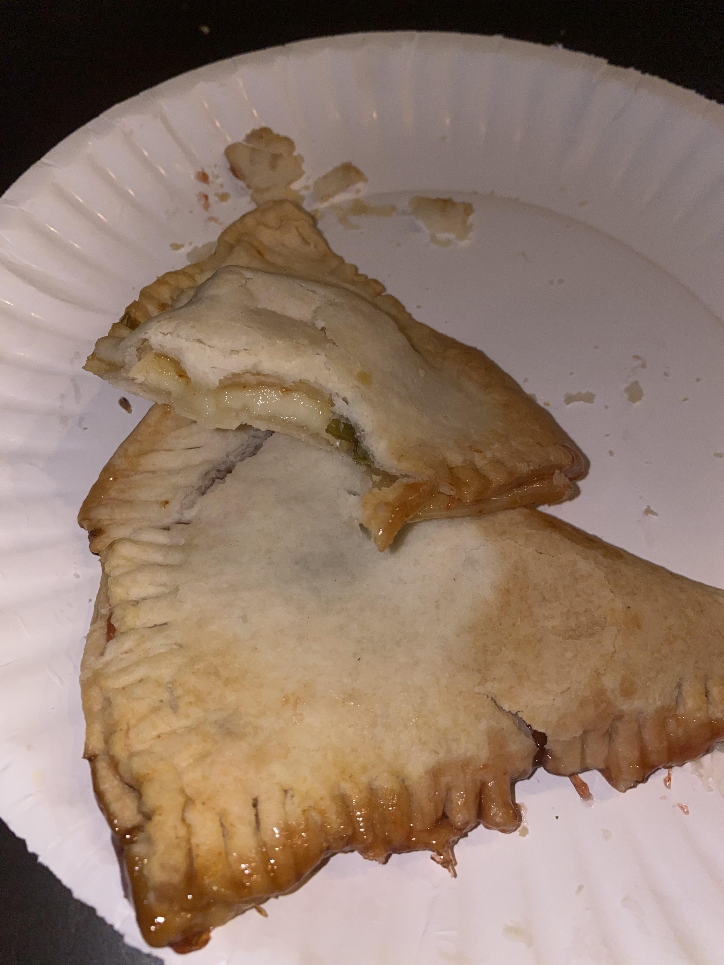 Brie and pepper jelly/strawberry rhubarb jam stuffed pie crust halves cooked in the air fryer ...