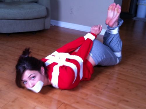 Brunette in white tape | Scrolller