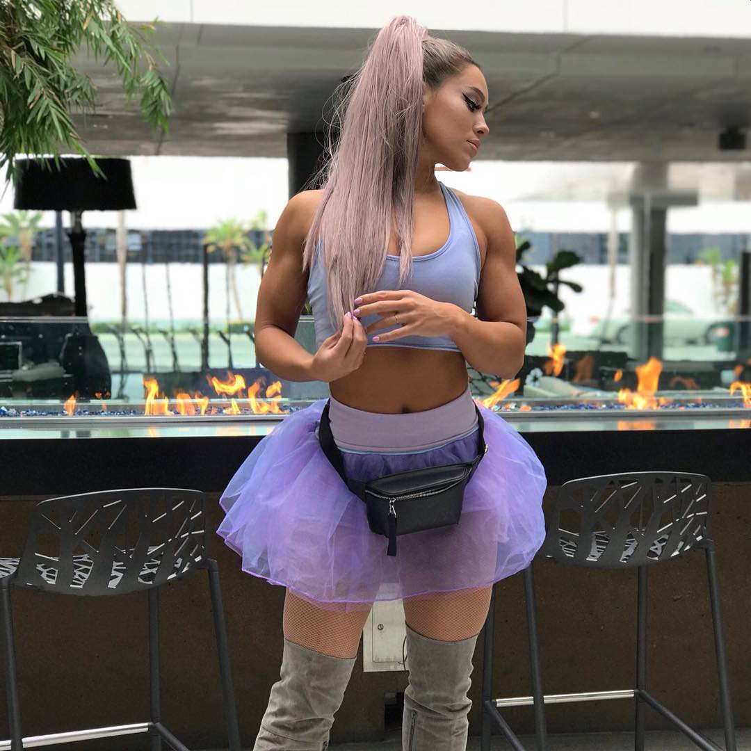 Cass Martin as a buff Ariana Grande | Scrolller