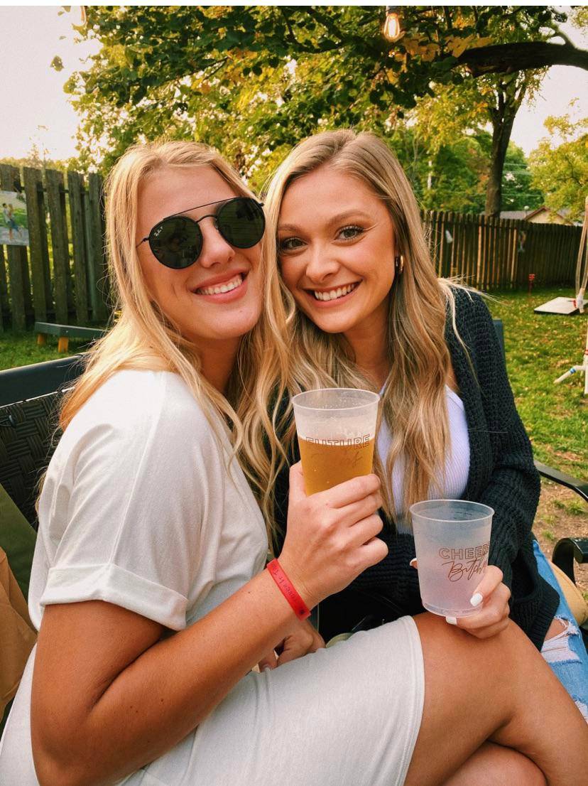 classy babes with beers | Scrolller