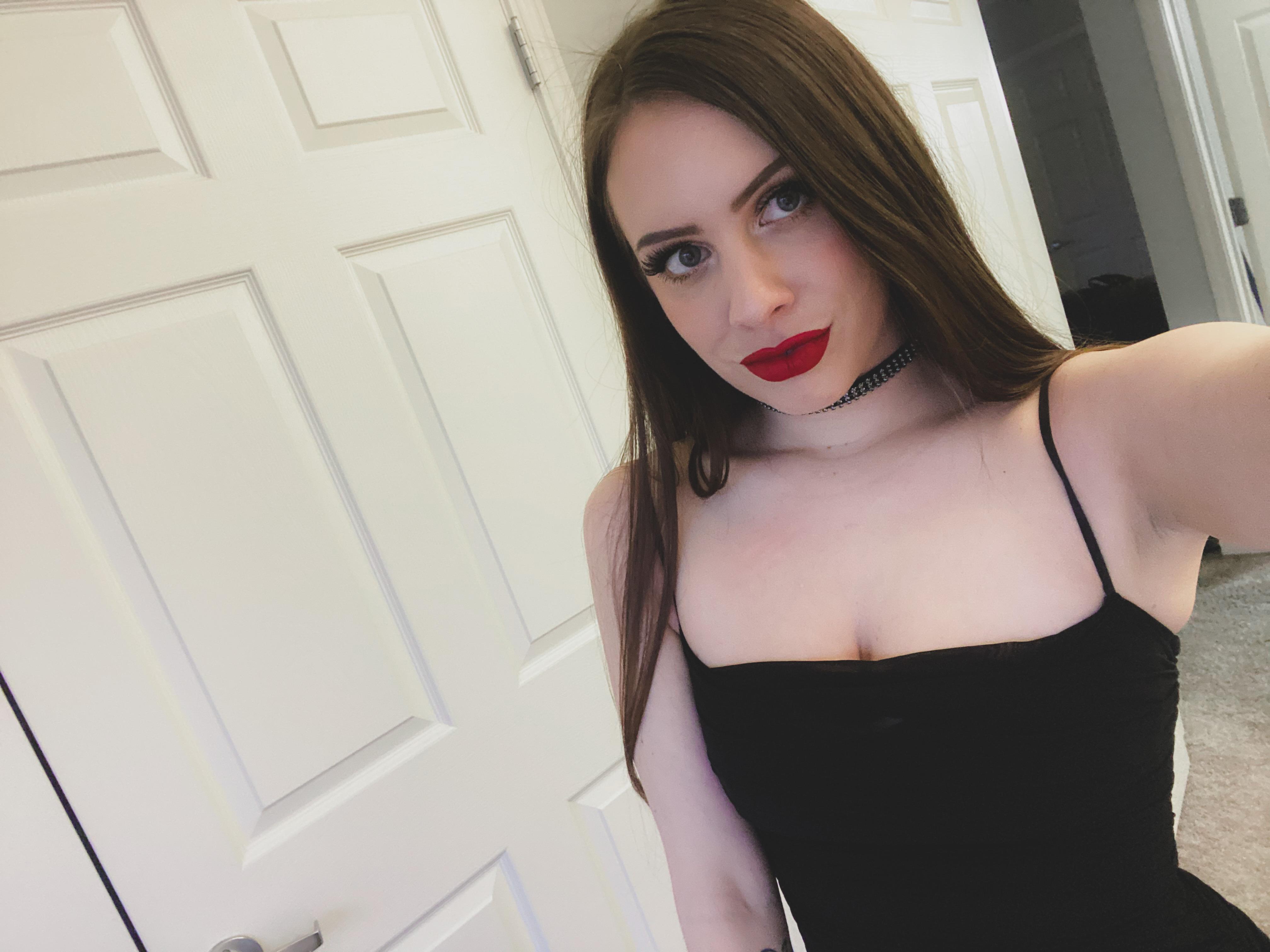 red lips and a little black dress are timeless | Scrolller