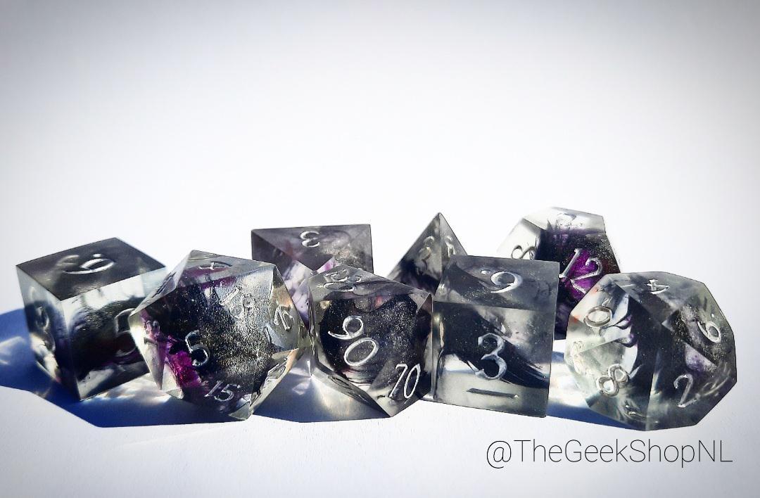 Custom Kenu dice with feathers | Scrolller