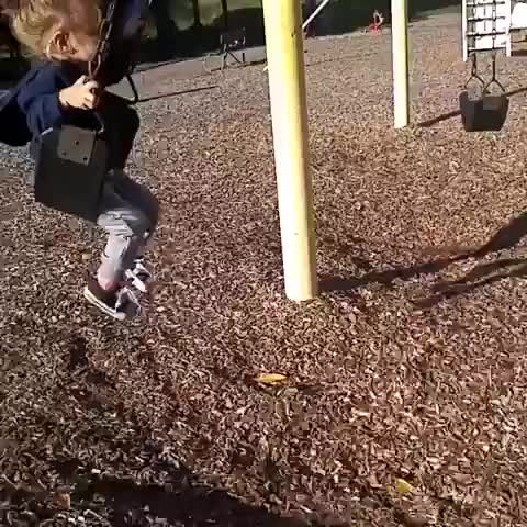 Dad catches daughter falling off swing | Scrolller