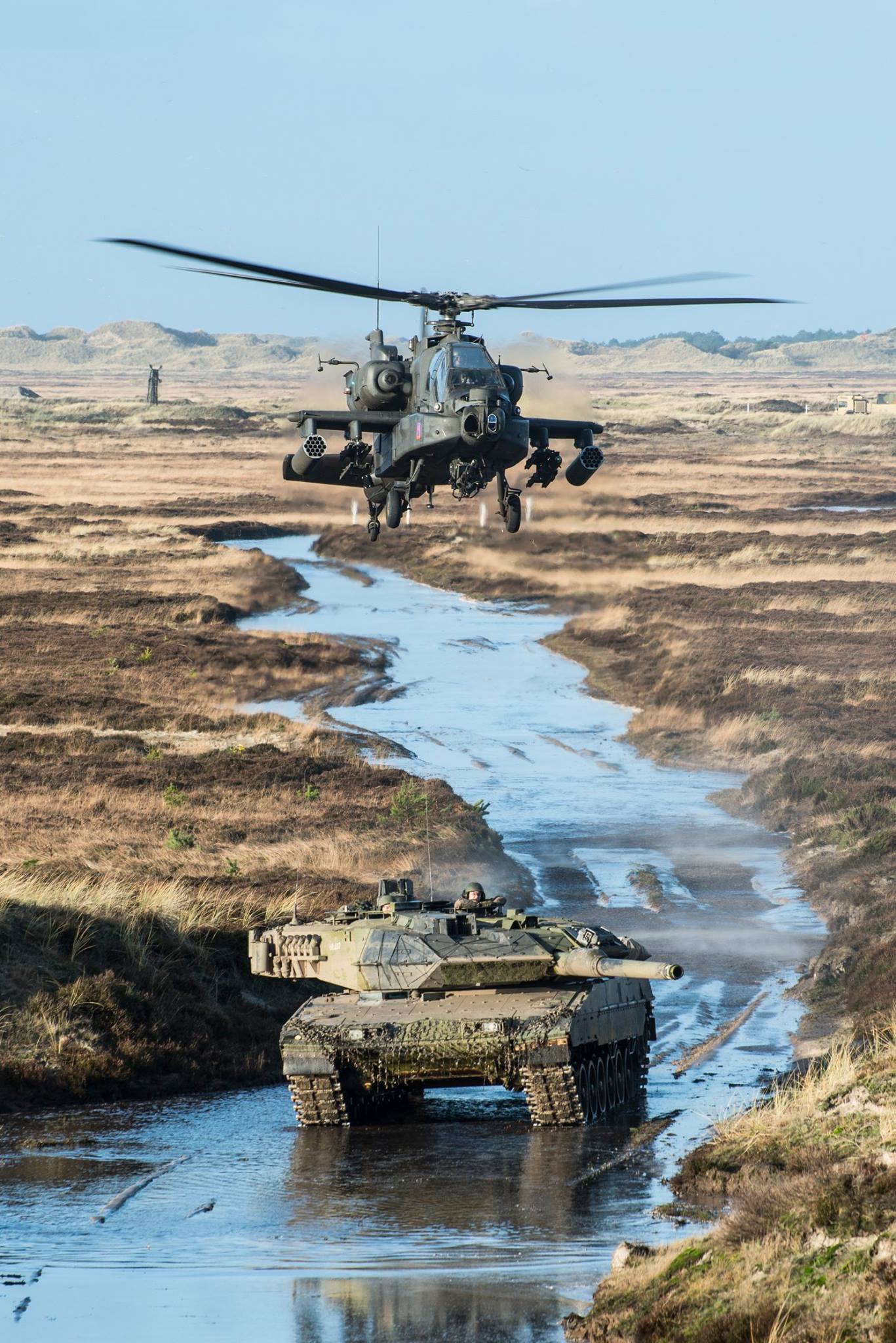 Danish Leopard Tank and a US Apache Helicopter. | Scrolller