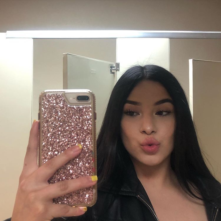 Dark hair, pink lips | Scrolller