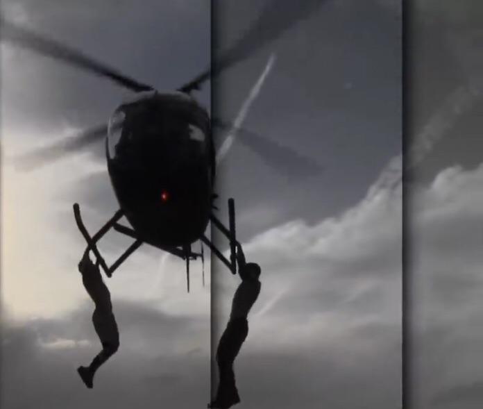 Doing pull-ups on a flying helicopter helicopter | Scrolller