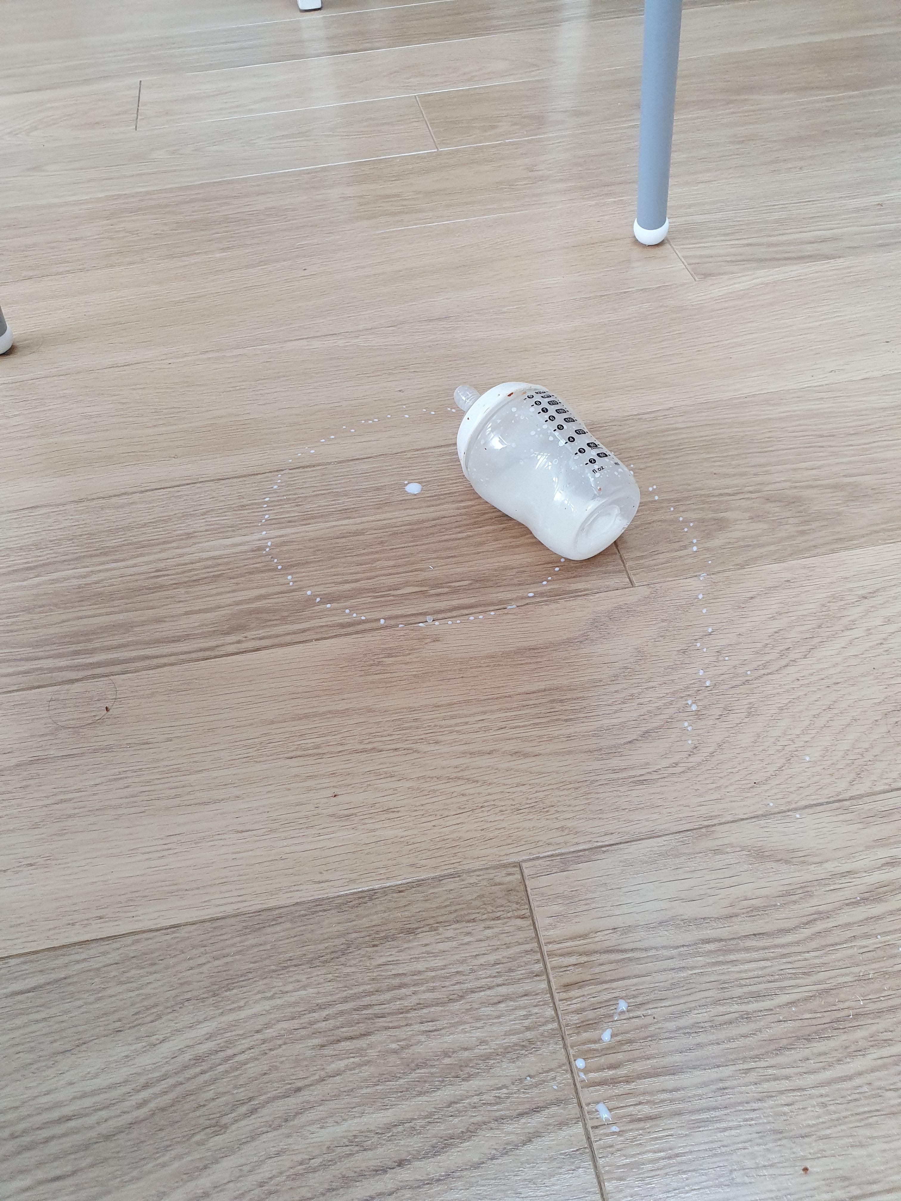 Dropped milk bottle | Scrolller