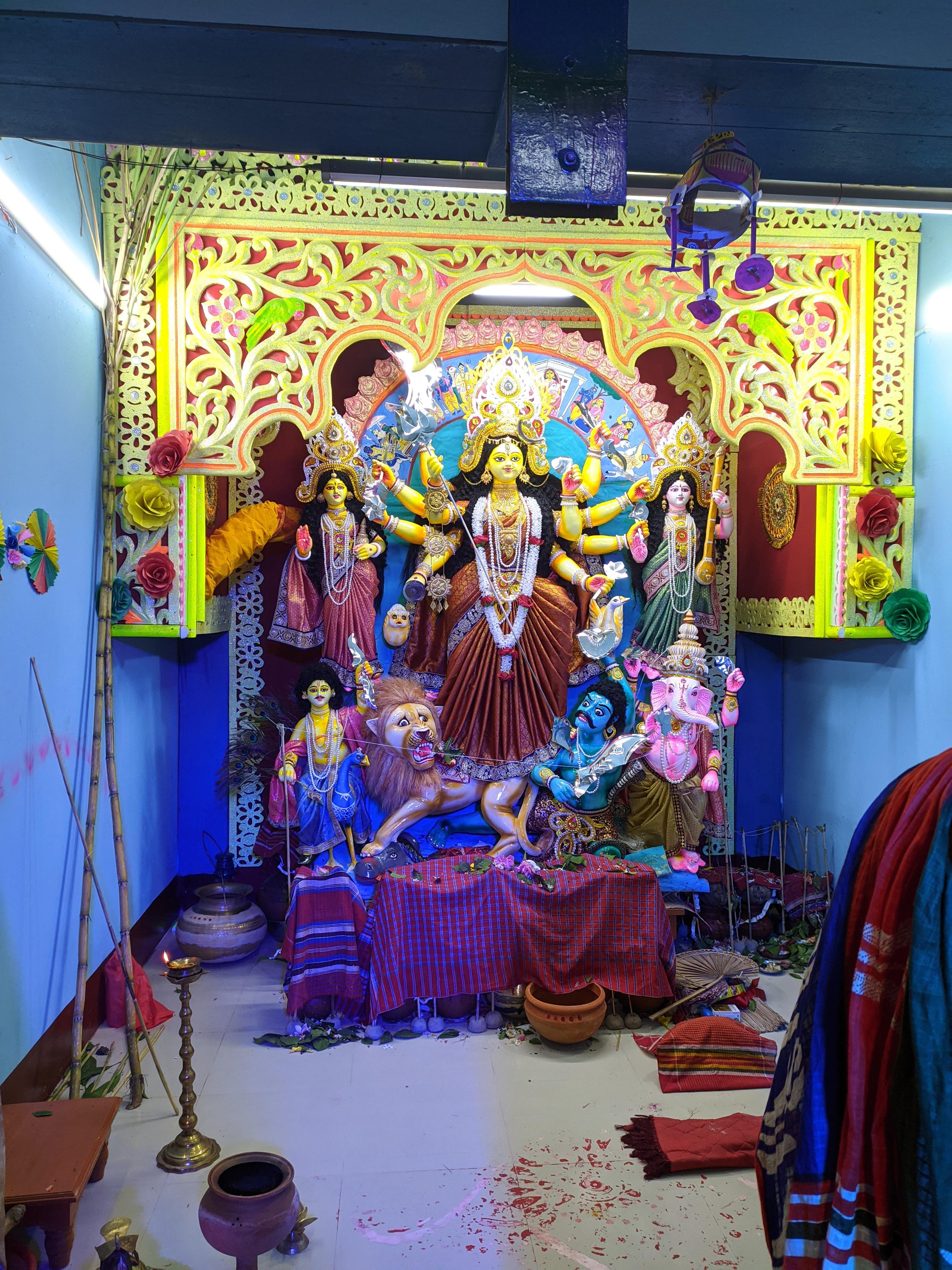 Durga Puja of a small-town shop in Bangladesh. | Scrolller