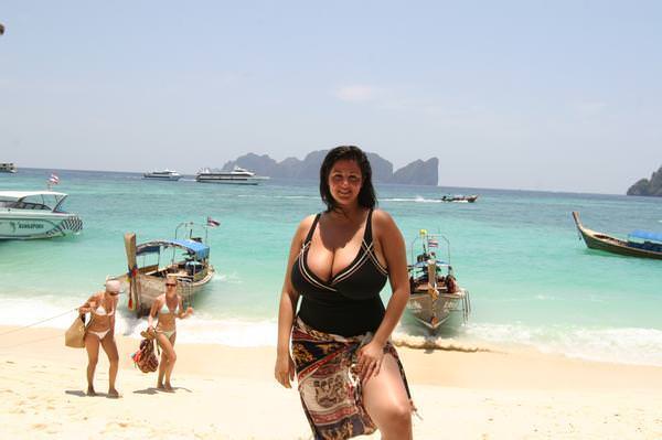 Eden Mor and her giant cleavage in a one piece | Scrolller