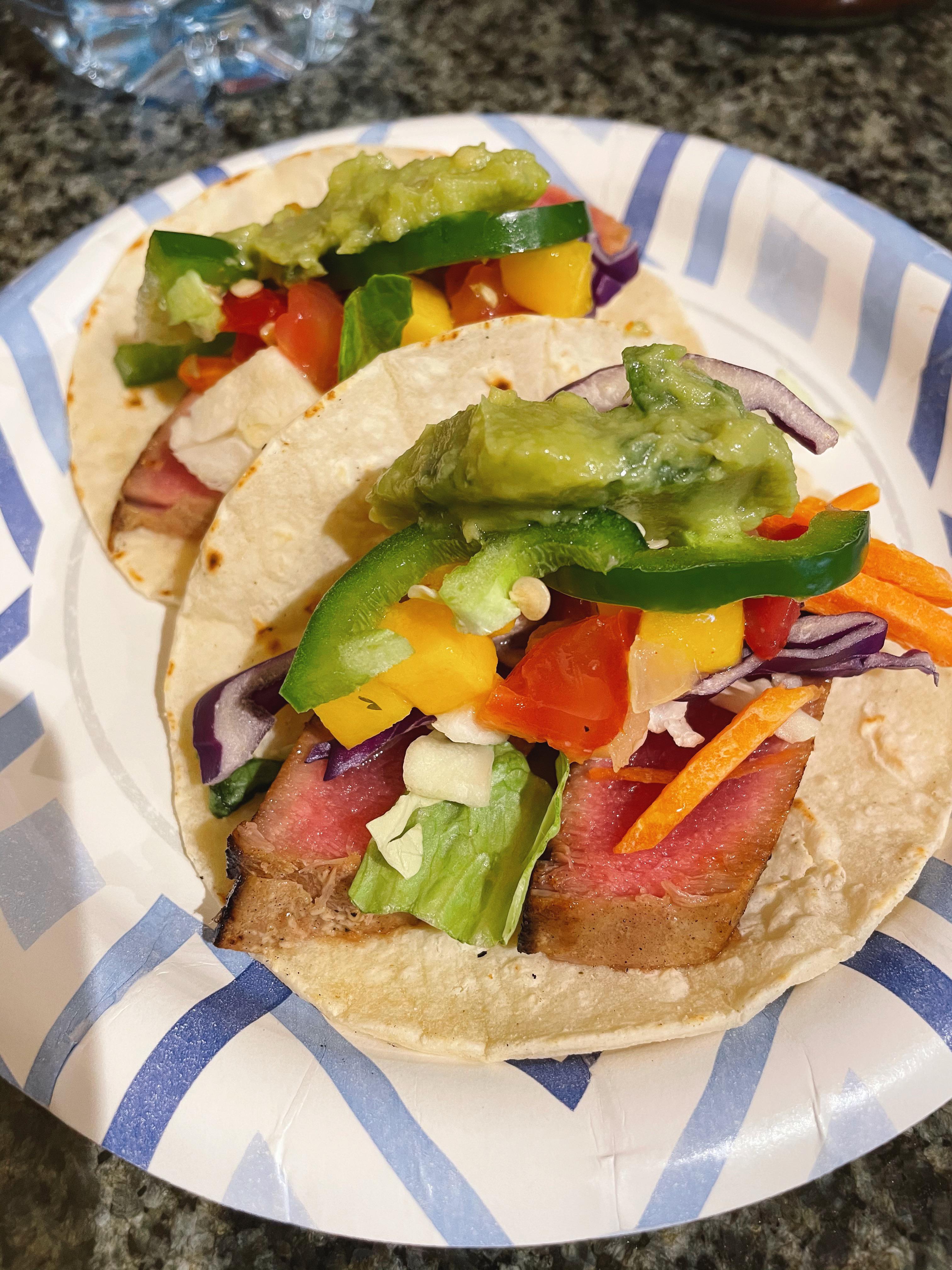 ~Excuse the paper plate~ but I made ahi tuna tacos with guacamole and mango salsa and they were ...