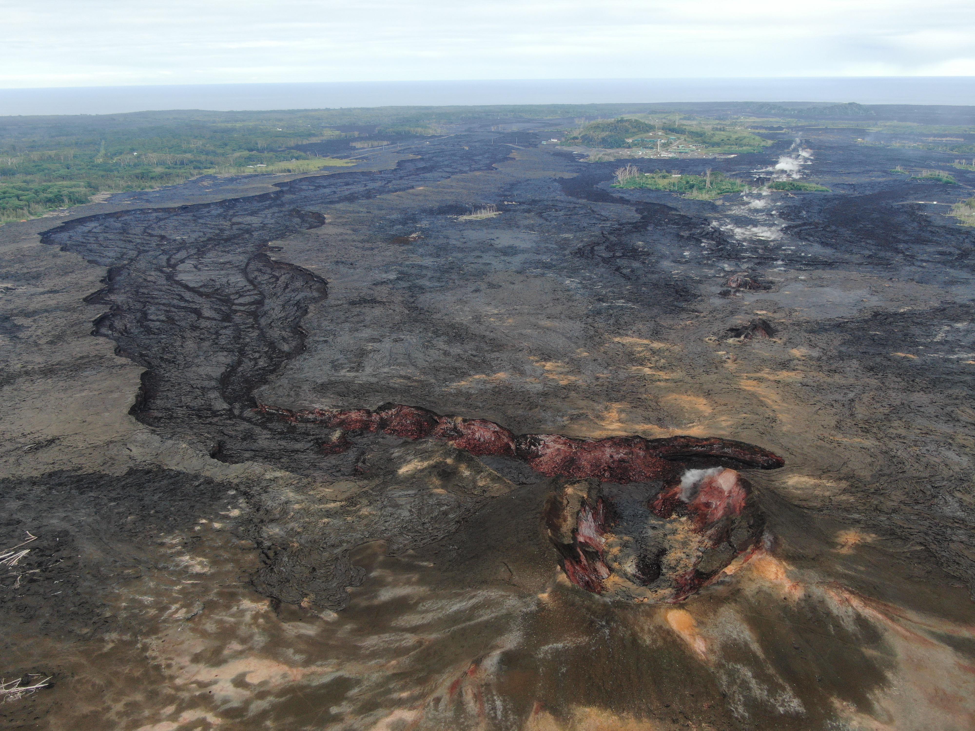 Fissure 8 and lava river channel from the 2018 Kīlauea eruption photographed from the air ...