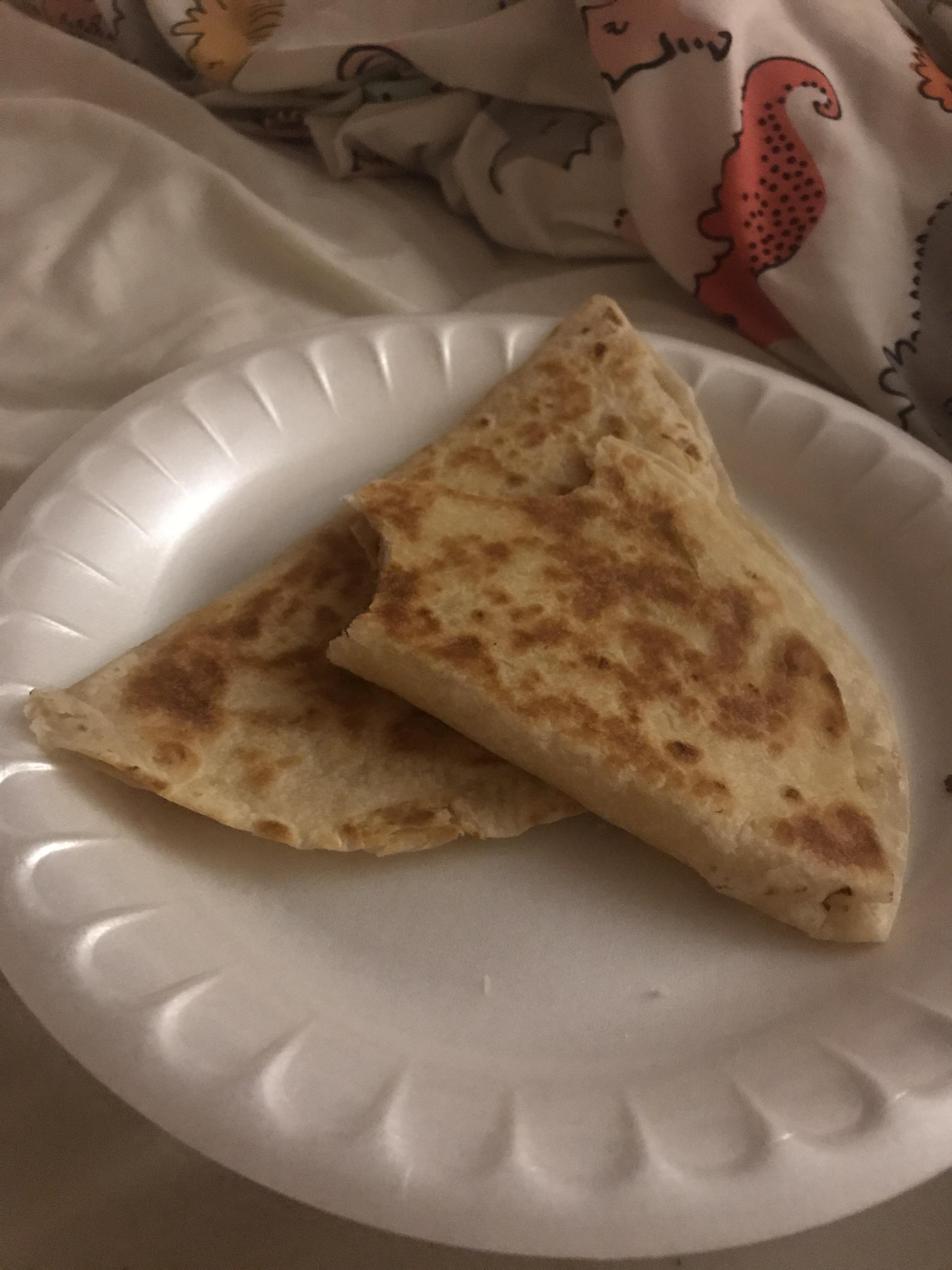 Flour tortillas slathered in butter with a mozzarella cheese filling | Scrolller