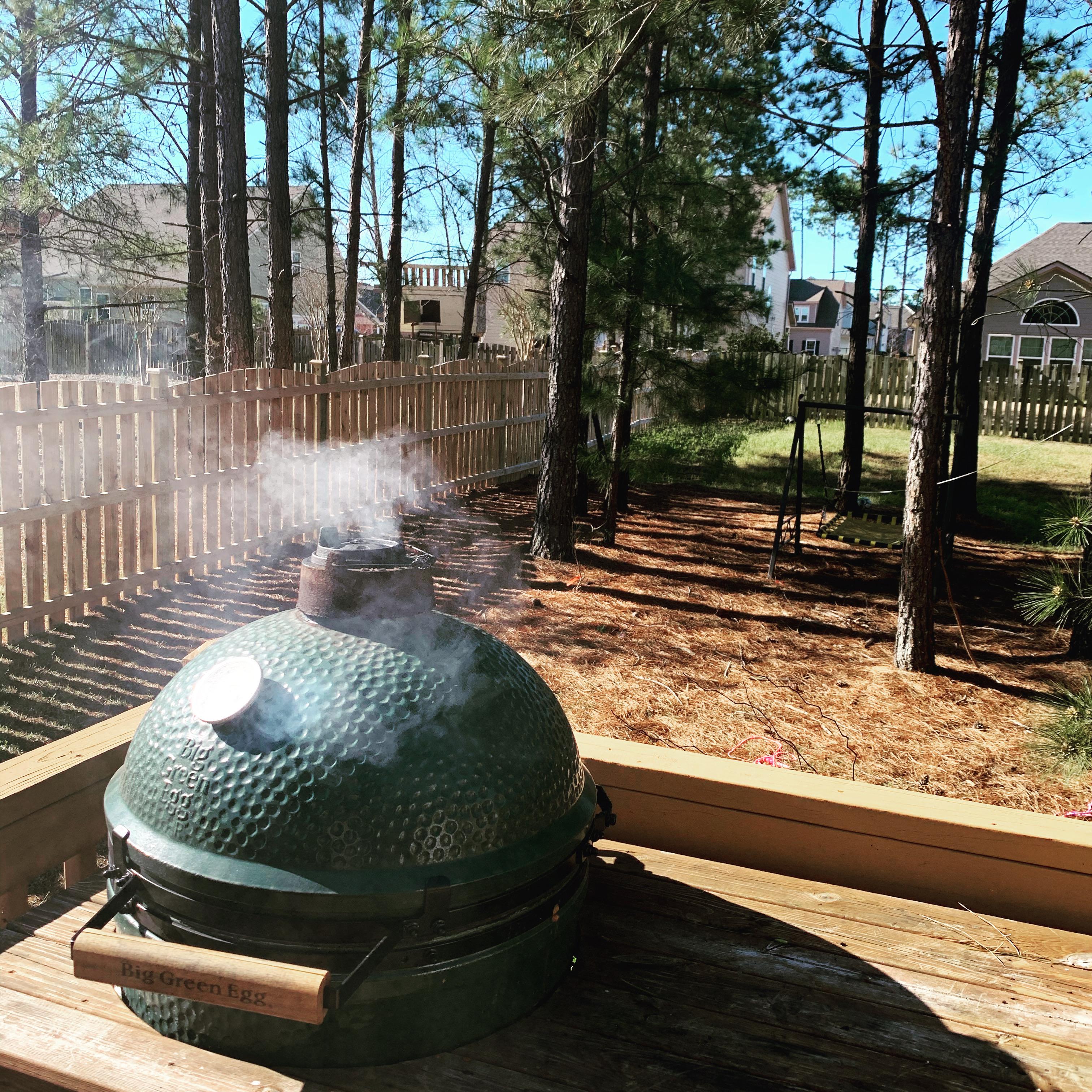 Got the lump rolling. 30lbs of pork under the dome. | Scrolller