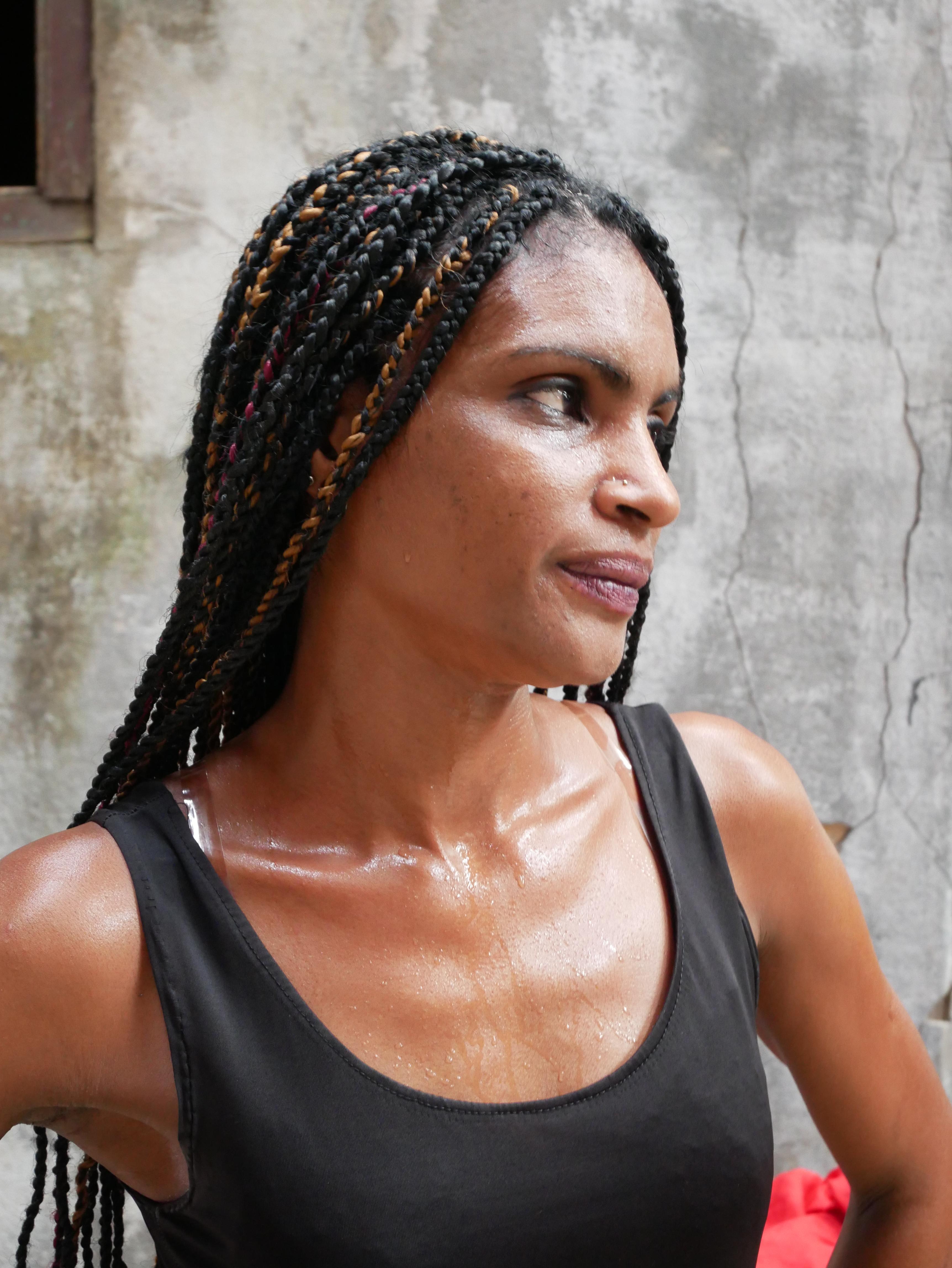 gray tank & dreadlocks | Scrolller