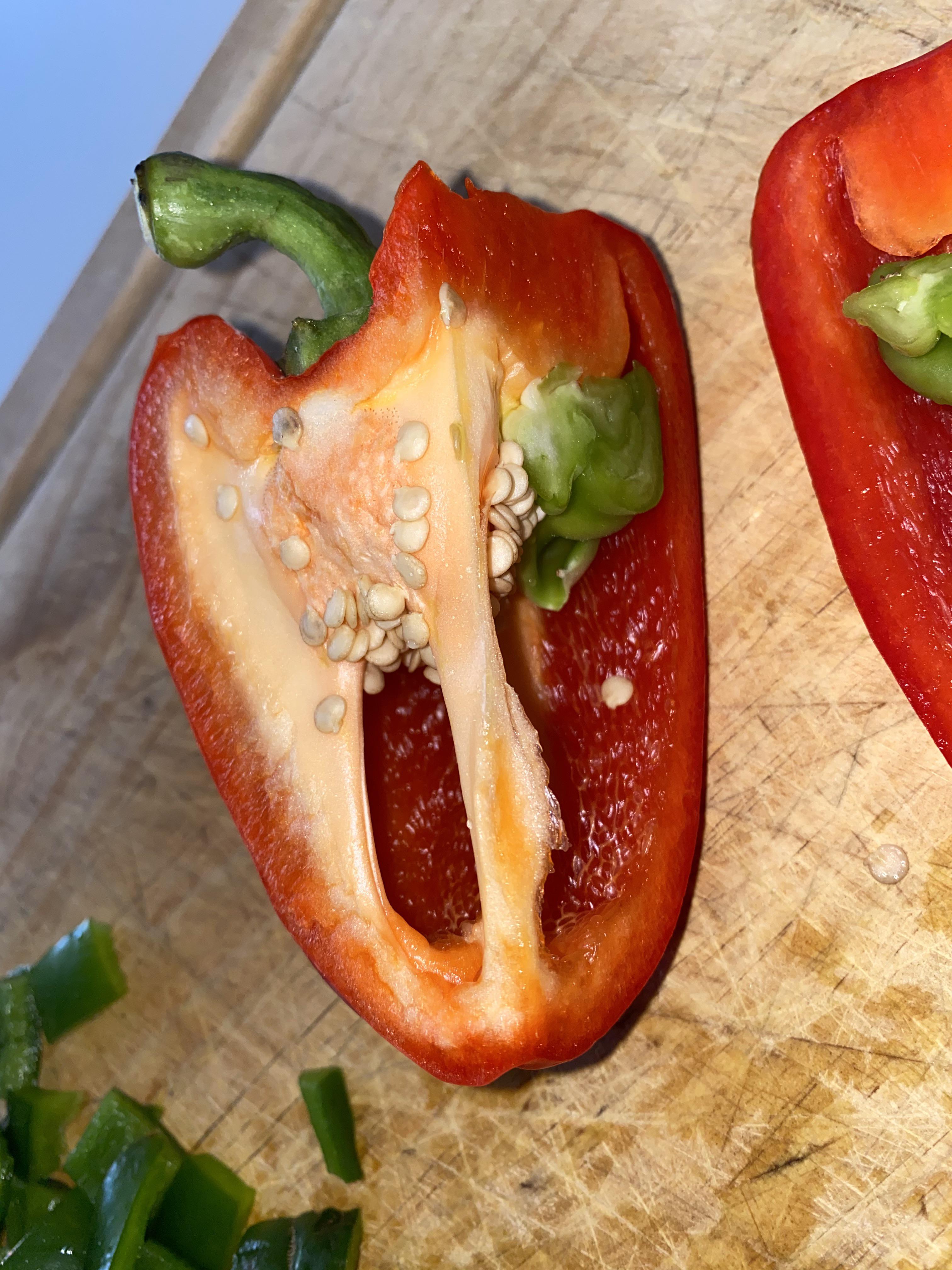 Green pepper inside red? Does anyone know why I sliced up a pepper this morning and it had a ...
