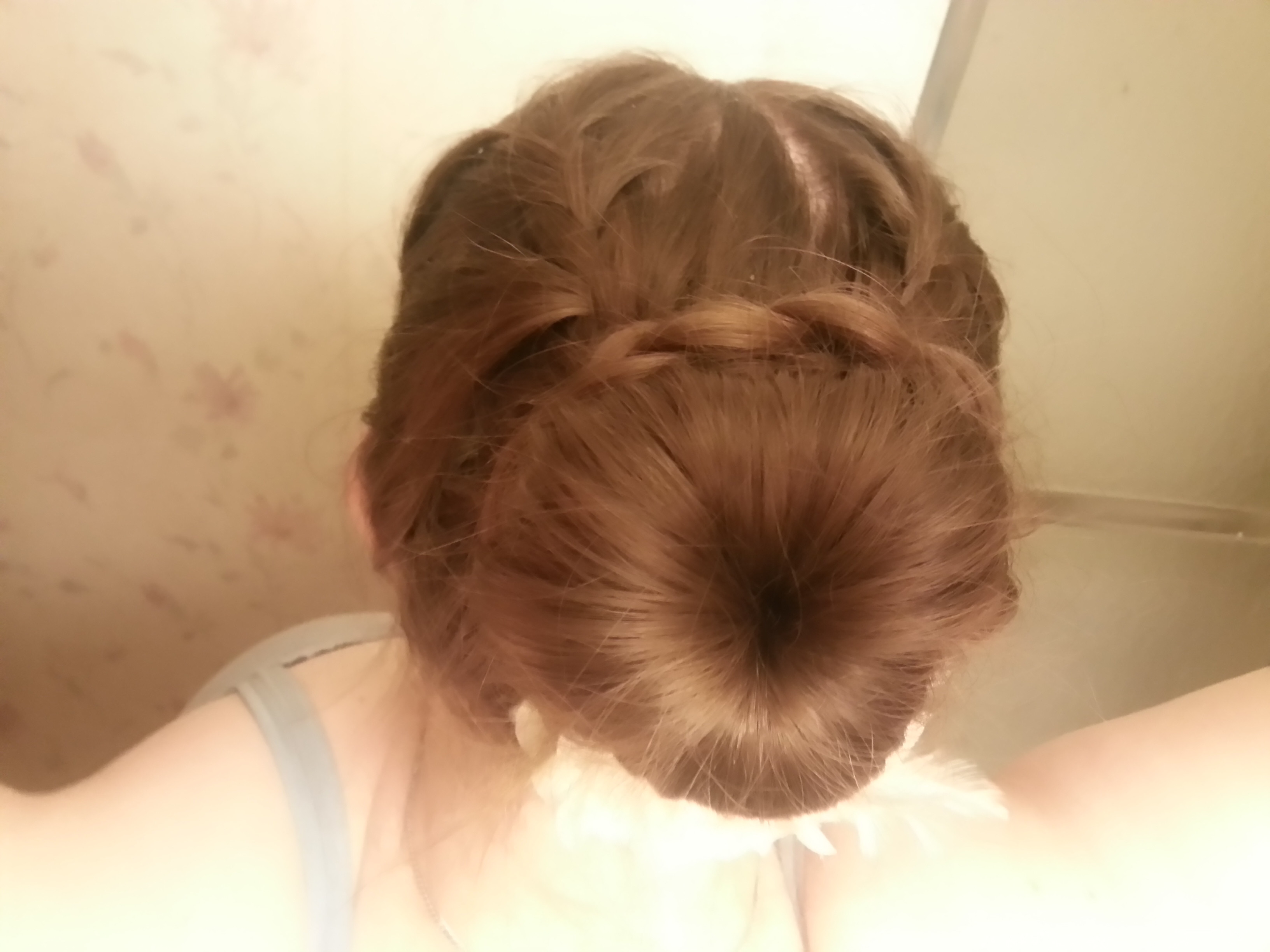 Heart bun with french braid accents | Scrolller