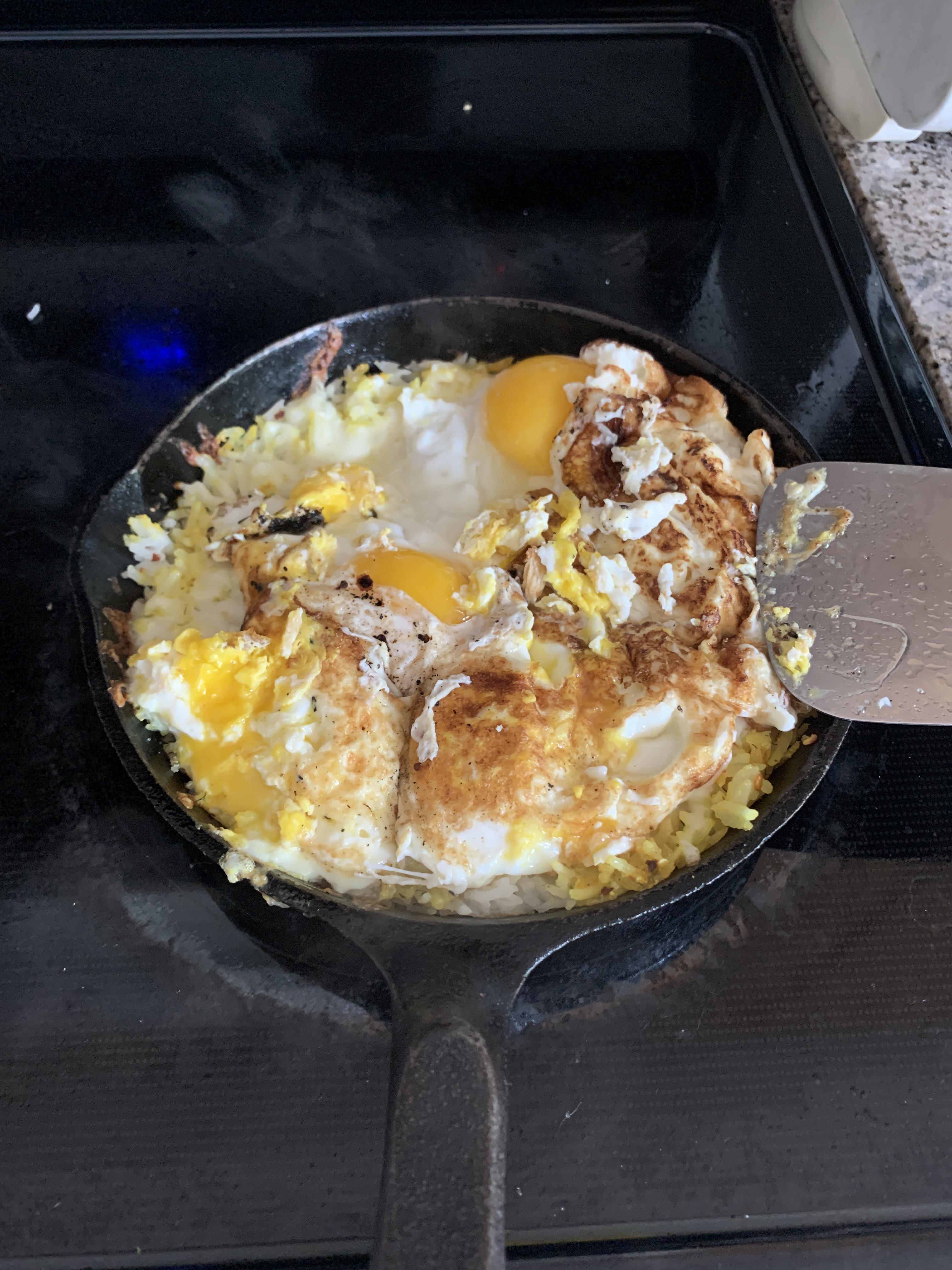 [Homemade] eggs and mozzarella cheese over bacon fried basmati rice. | Scrolller