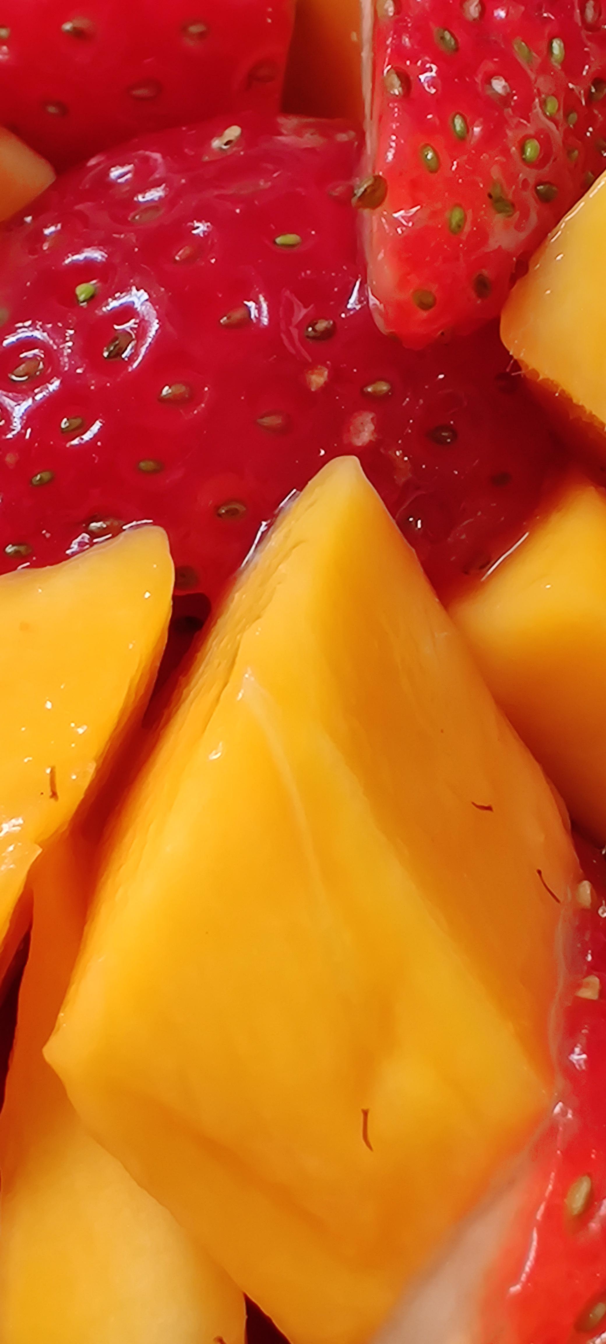 Honey mango and homegrown strawberry salad. | Scrolller