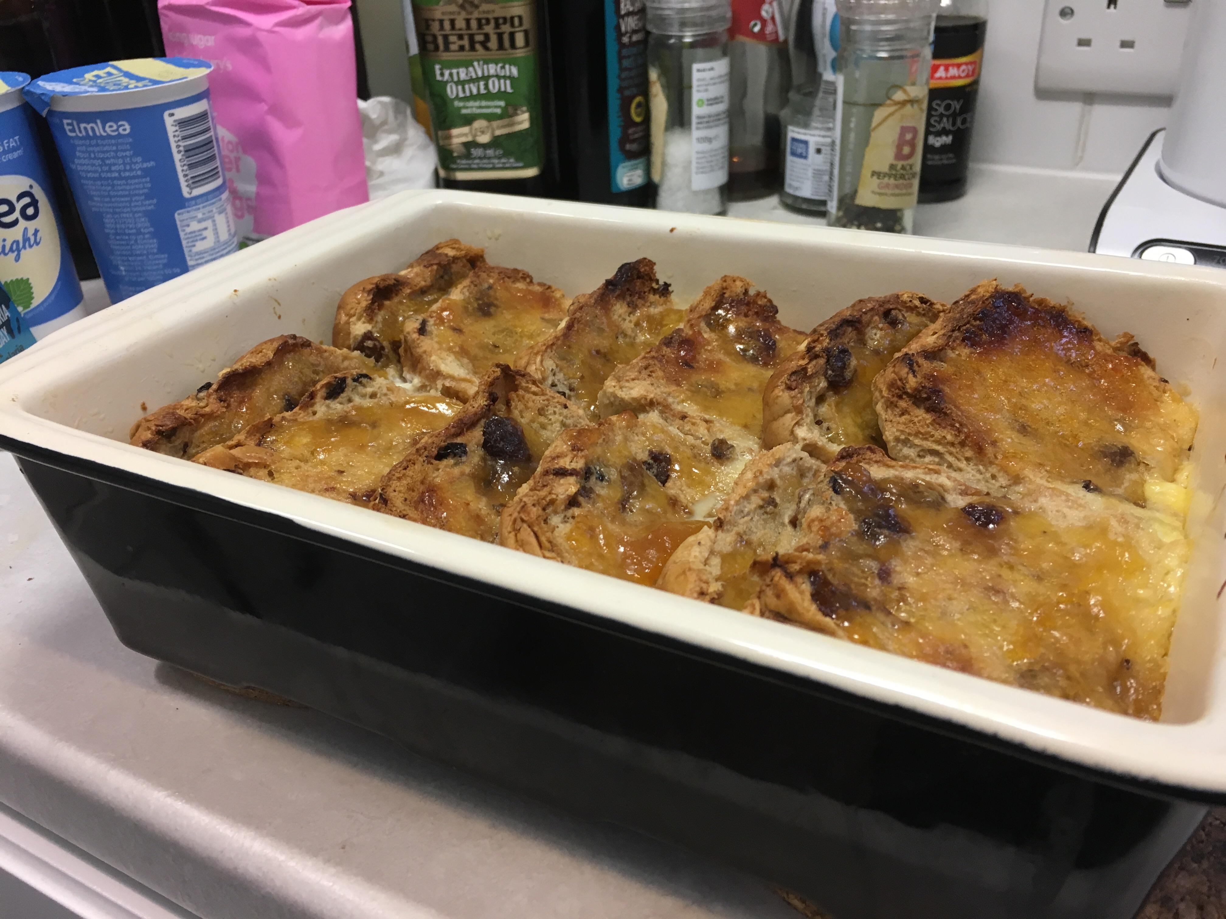 Hot-cross bun and butter pudding with apricot jam. | Scrolller