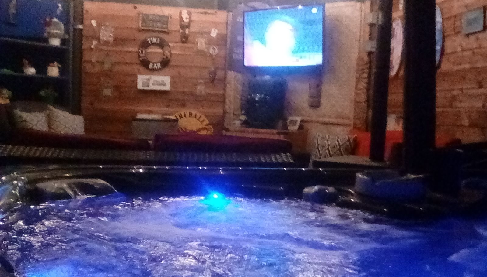 Hot Tub is up and running, overlooks our tiki bar. Cheers! | Scrolller