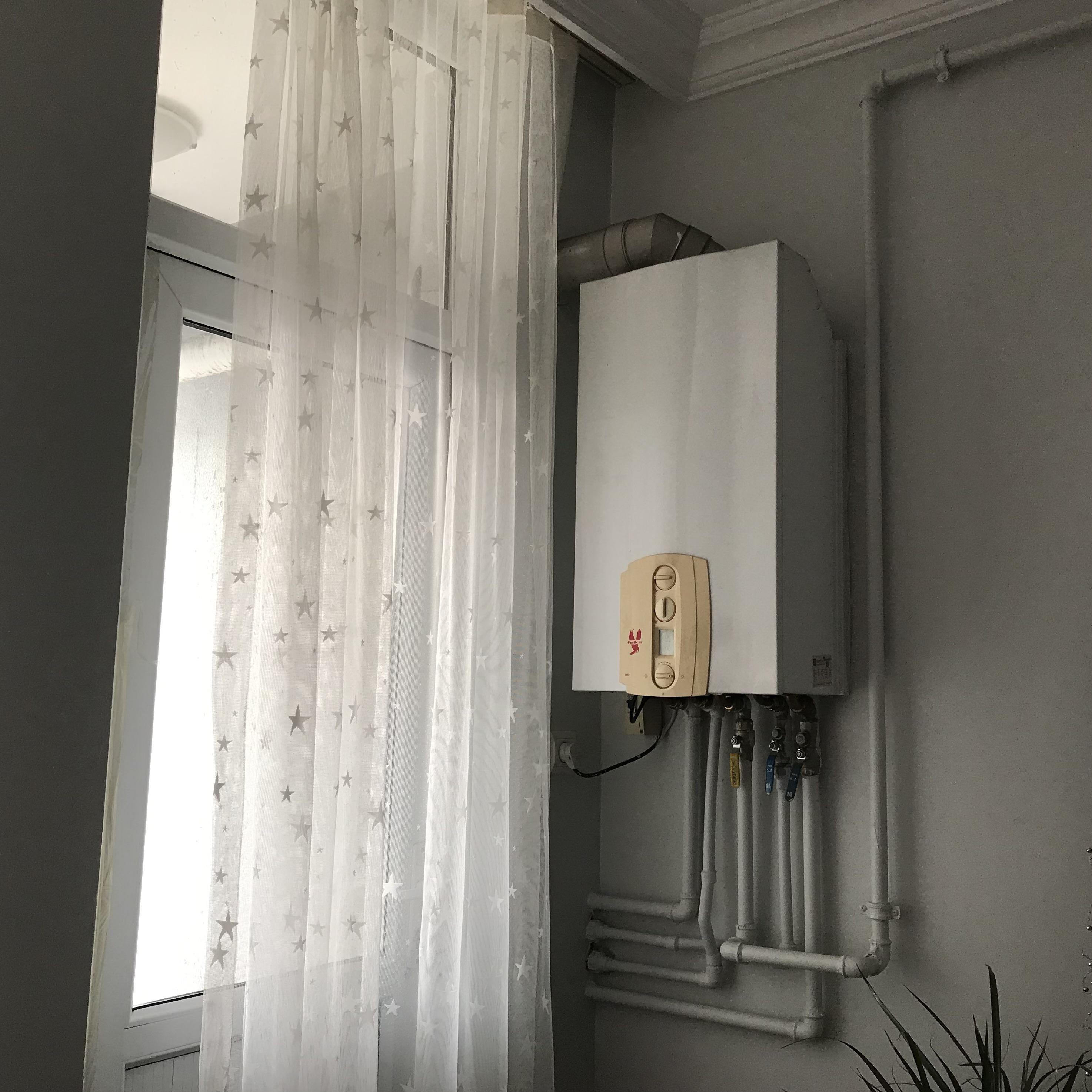How can one make this corner look better ? (boiler and the pipes in the living room ) | Scrolller