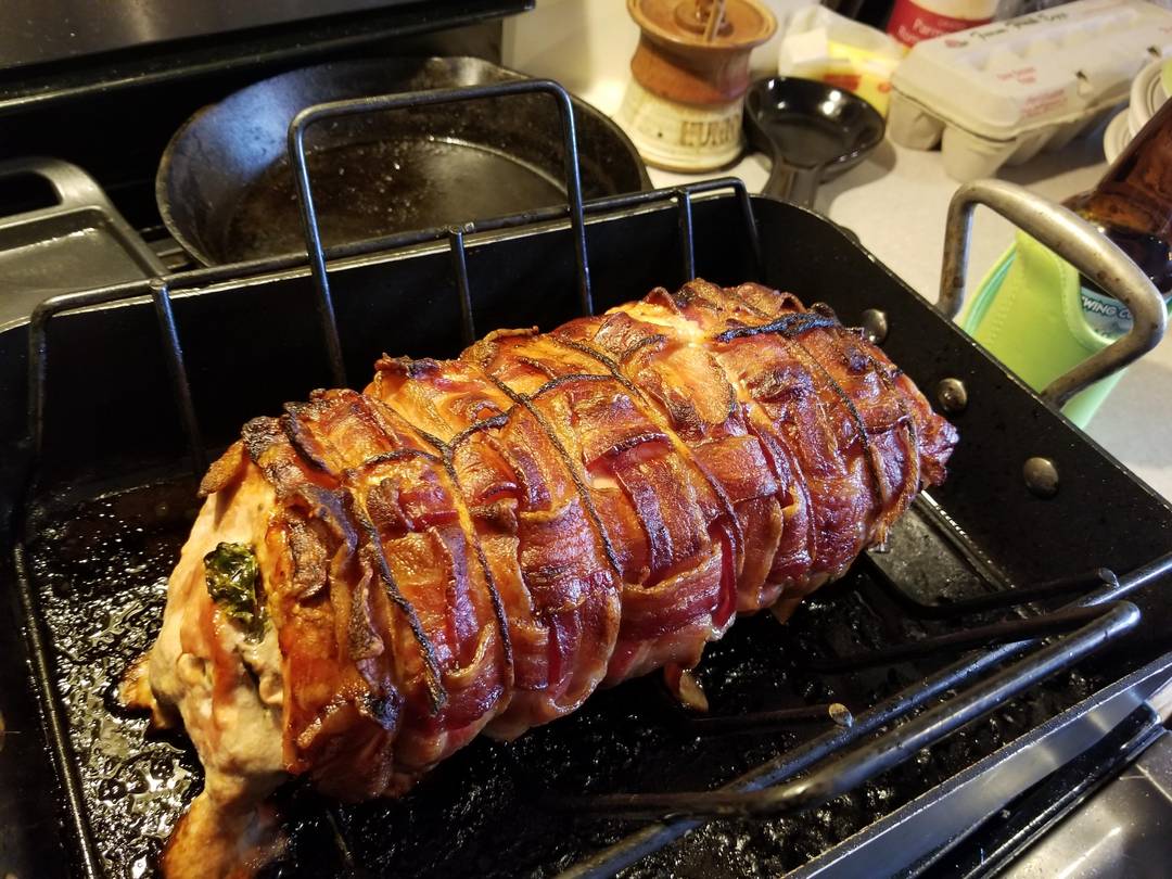 I made a bacon wrapped pork loin stuffed with spinach, morels, hazelnuts and Rogue blue cheese ...