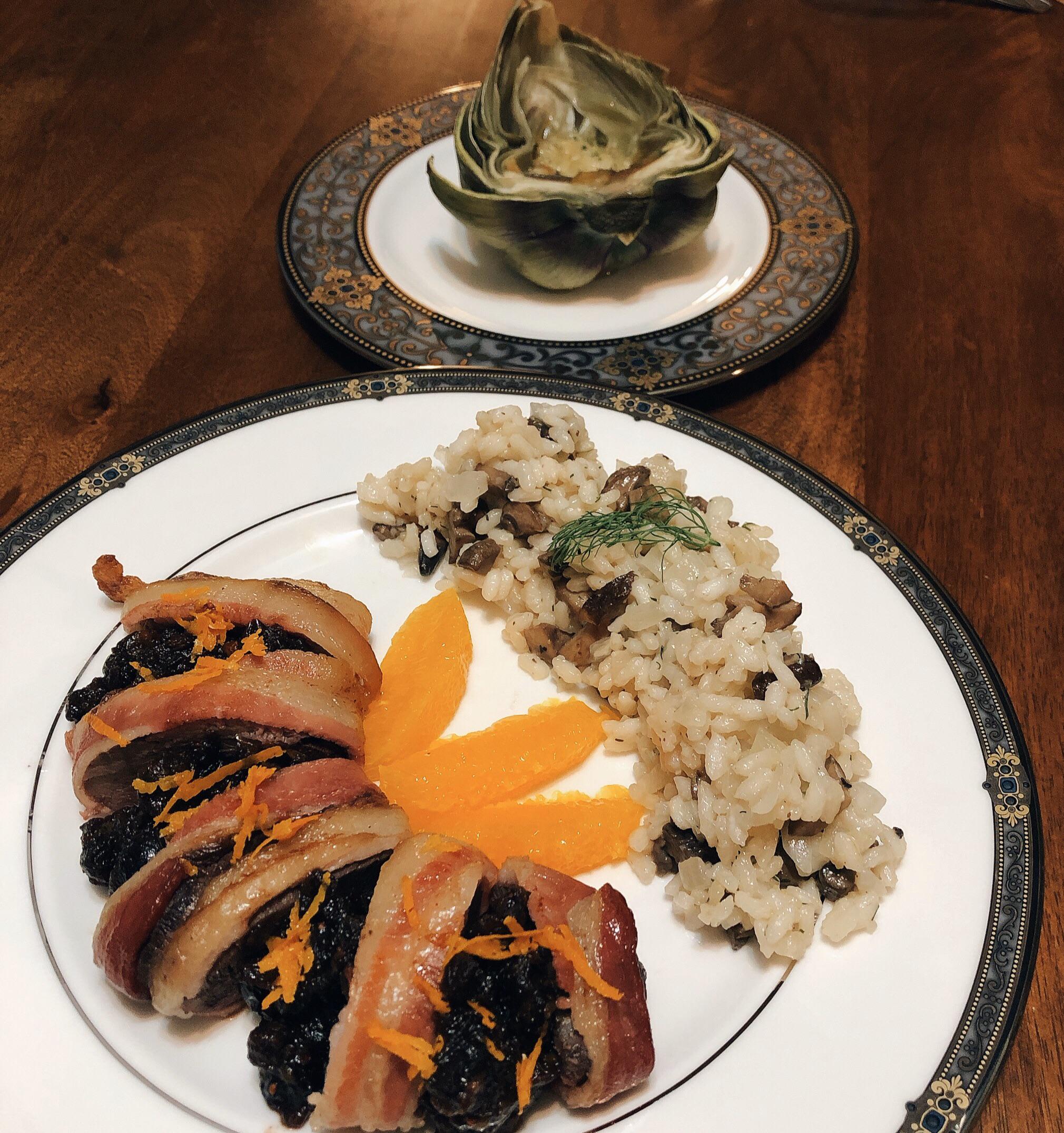 [I made] bacon wrapped duck breast, cranberry orange “sauce,” risotto, and artichoke with ...