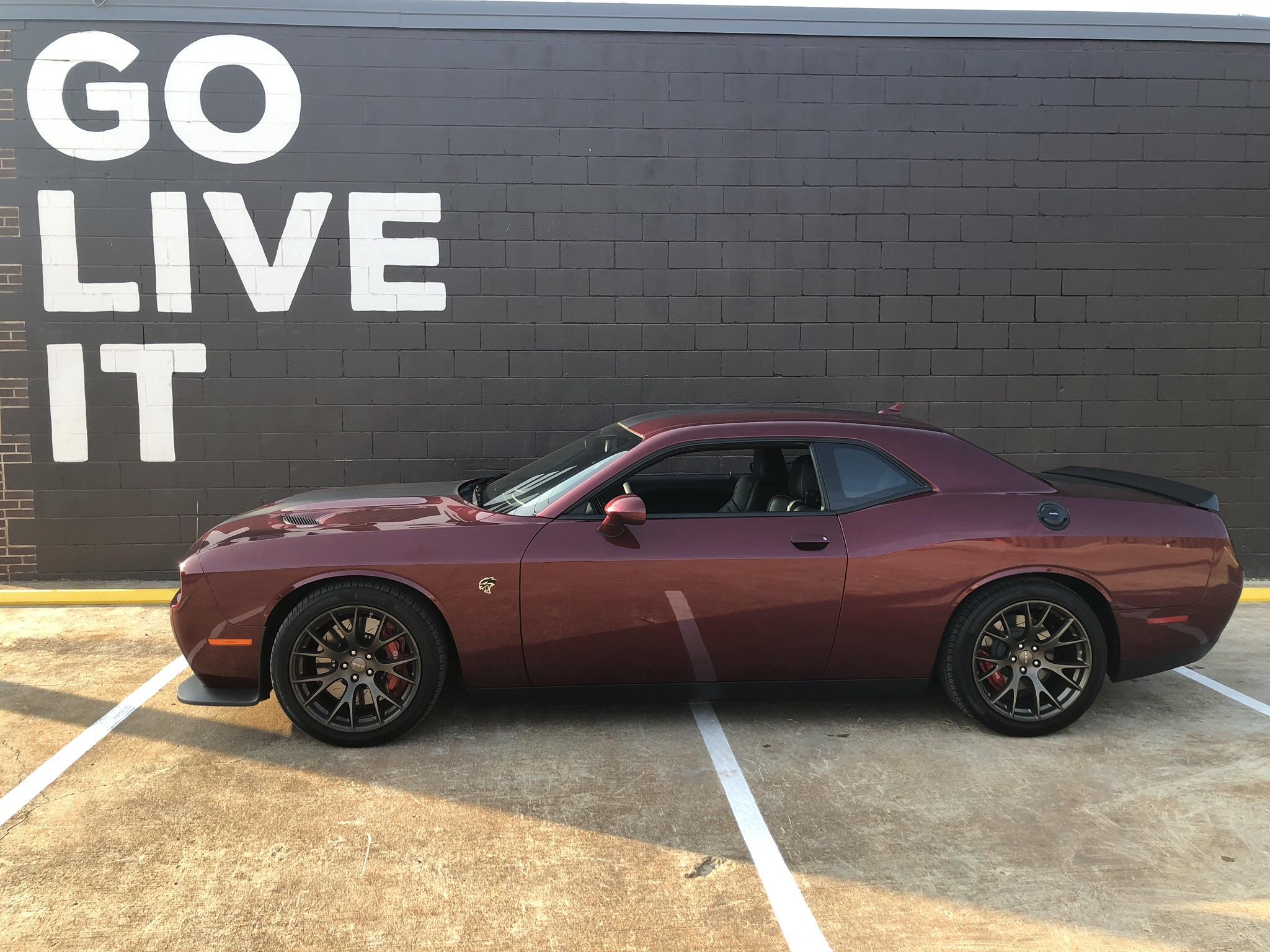 I saw this and had to get a picture of my Hellcat with it. | Scrolller