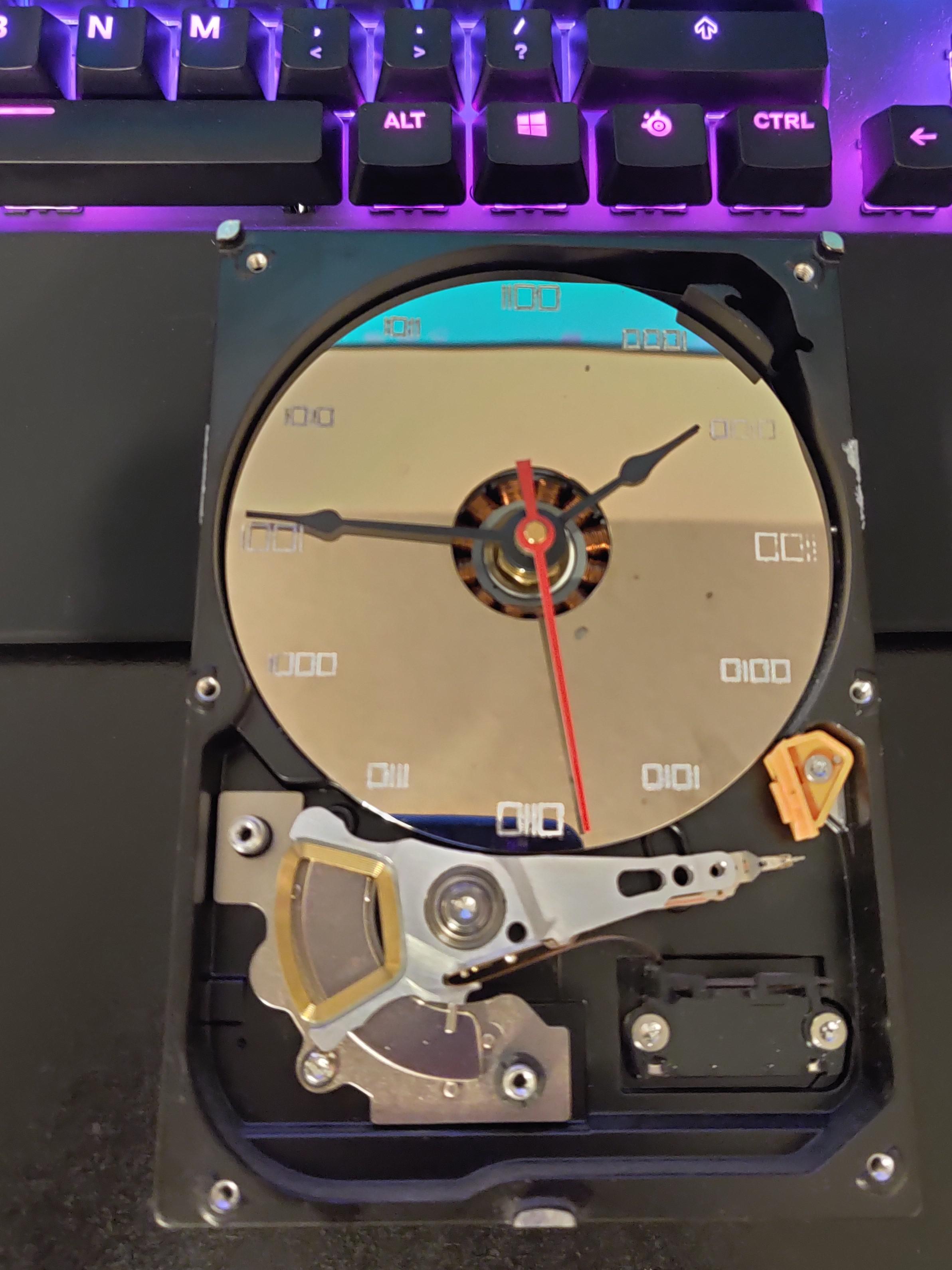 I see your CD clock and I raise you a HDD clock, in binary! | Scrolller