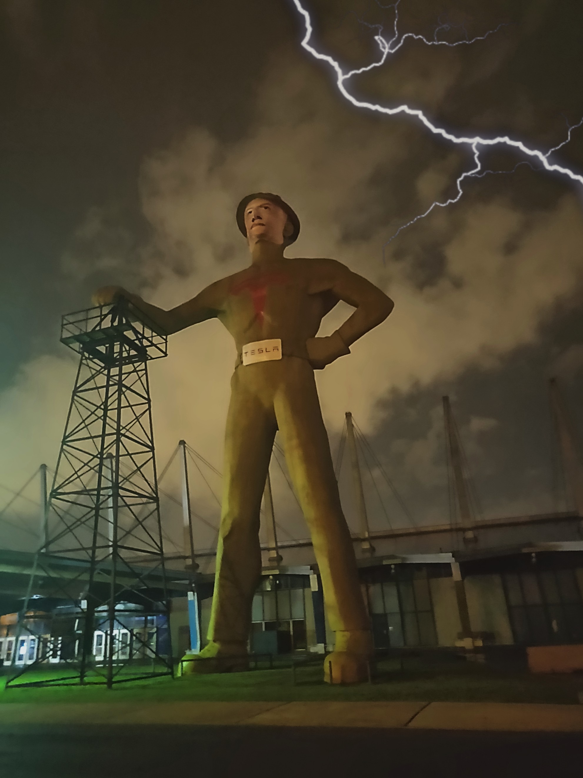 I took this terrifying photo of the Giga Elon last night during the storm. I added the lightning ...