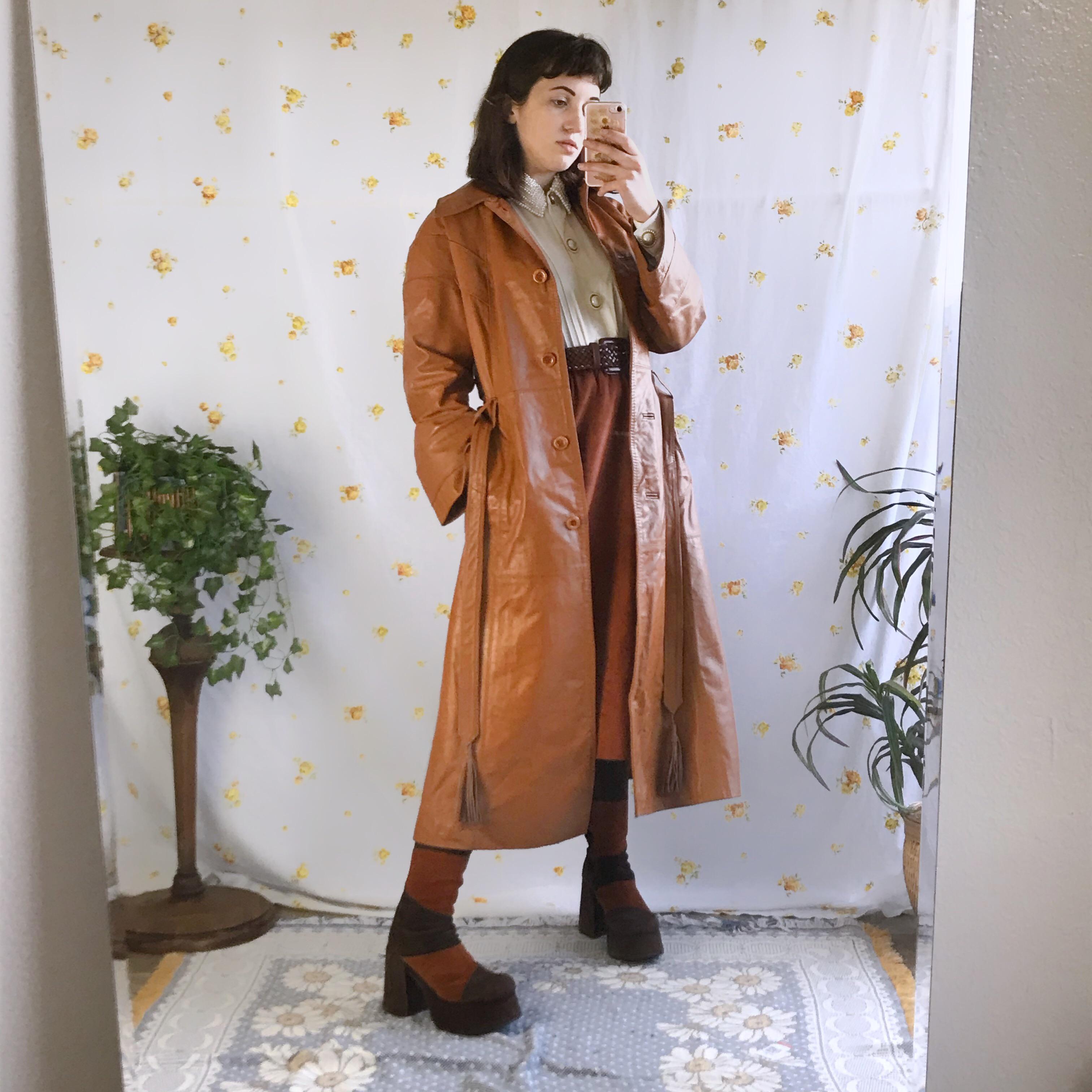 I’ve really been into the massive platform boots/A-line skirt combo lately, finished off with a ...