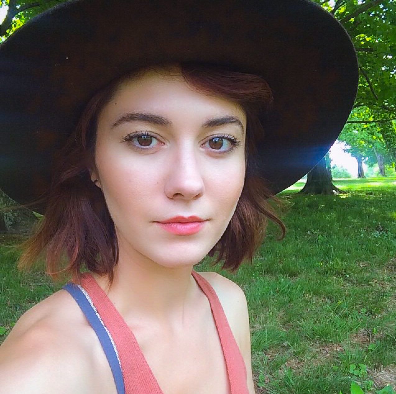 In Her Sun Hat | Scrolller