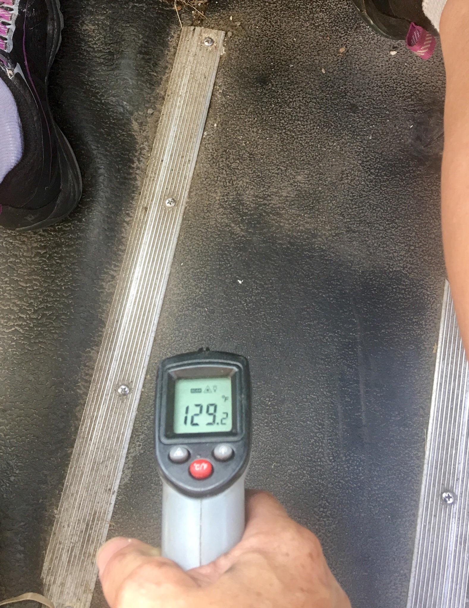 Infrared thermometer showing the floor of the LLV at 129 degrees. Taken by me on an 85 degree ...