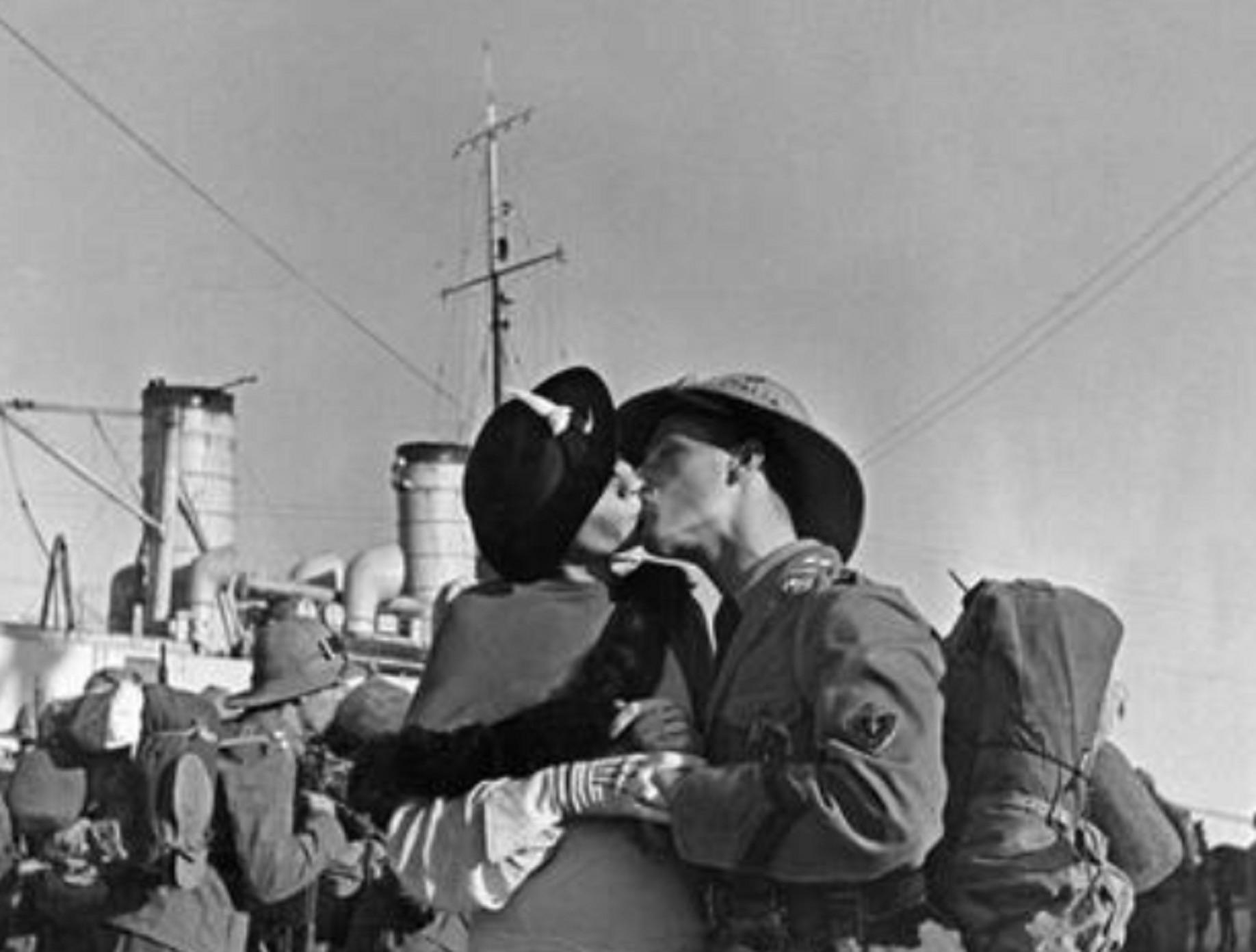 Italian soldier goodbye kiss to his wife before being shipped out. | Scrolller