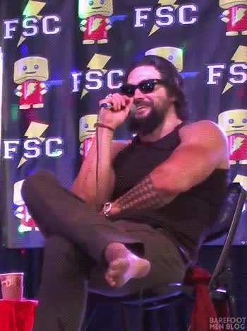 Jason Momoa barefoot at a ComicCon | Scrolller