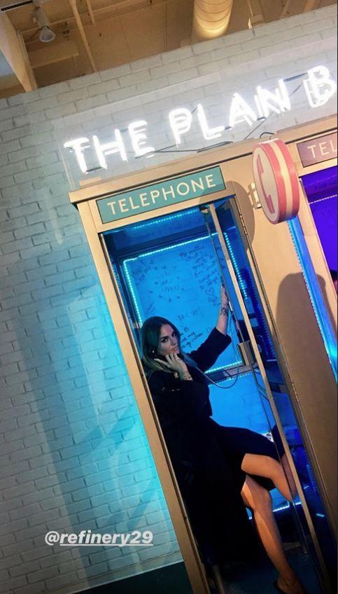 Jojo in phone booth. | Scrolller
